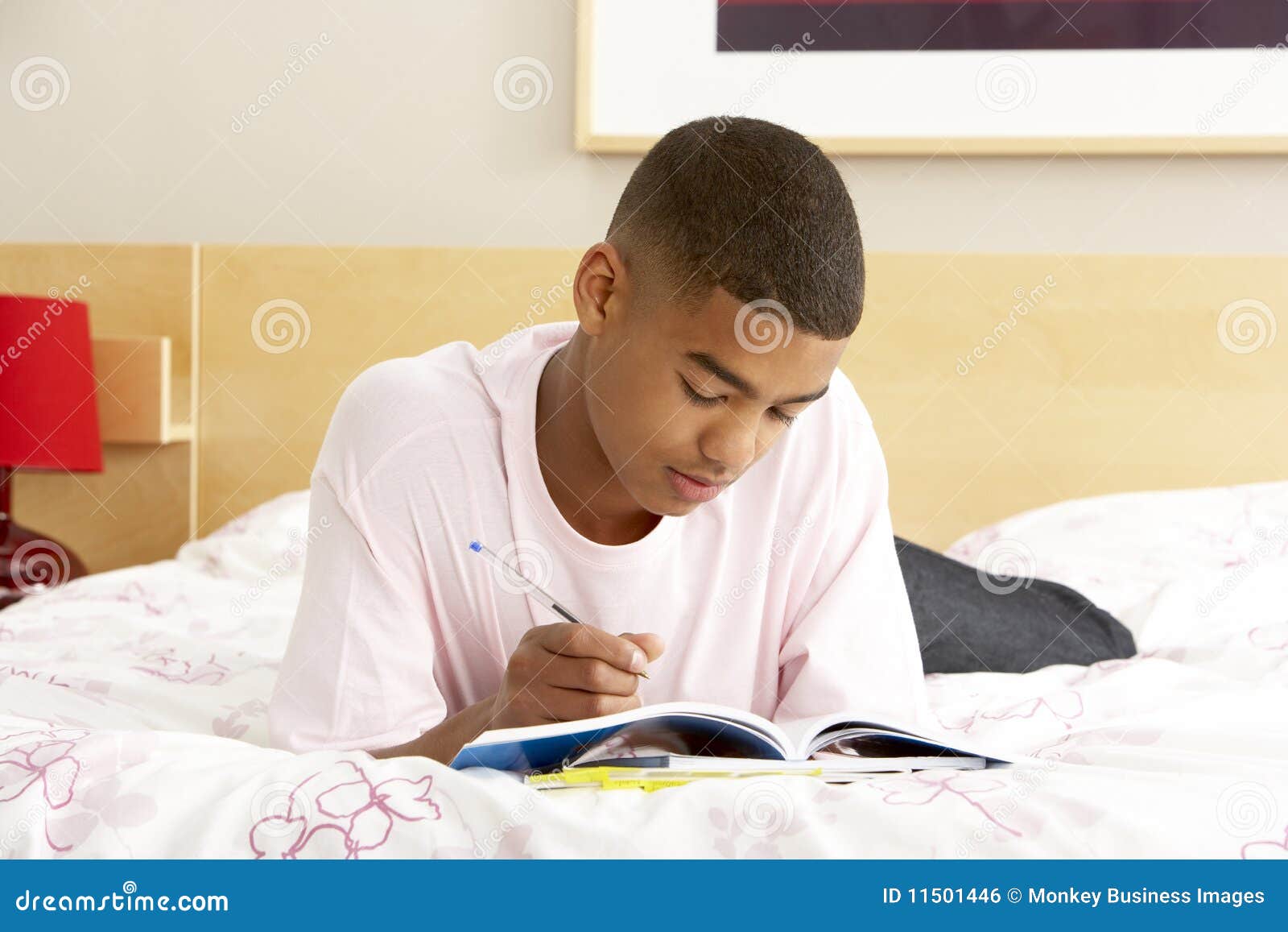 Teenage Boy Writing in Diary in Bedroom Stock Photo - Image of people ...