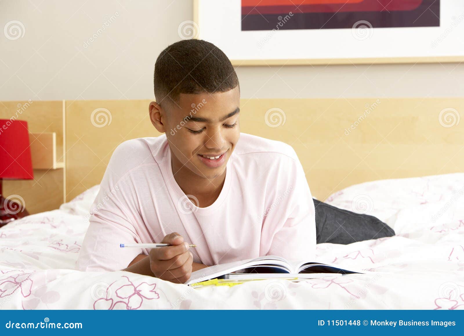 Teenage Boy Writing in Diary in Bedroom Stock Photo - Image of bedroom ...