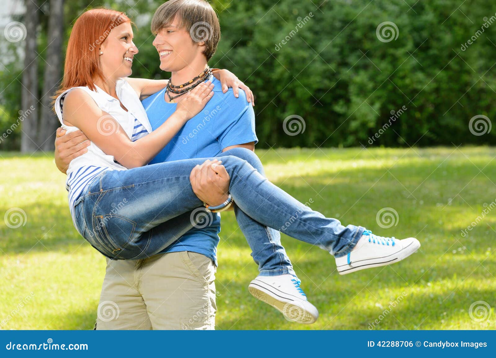 Guy Carrying Girl In Arms