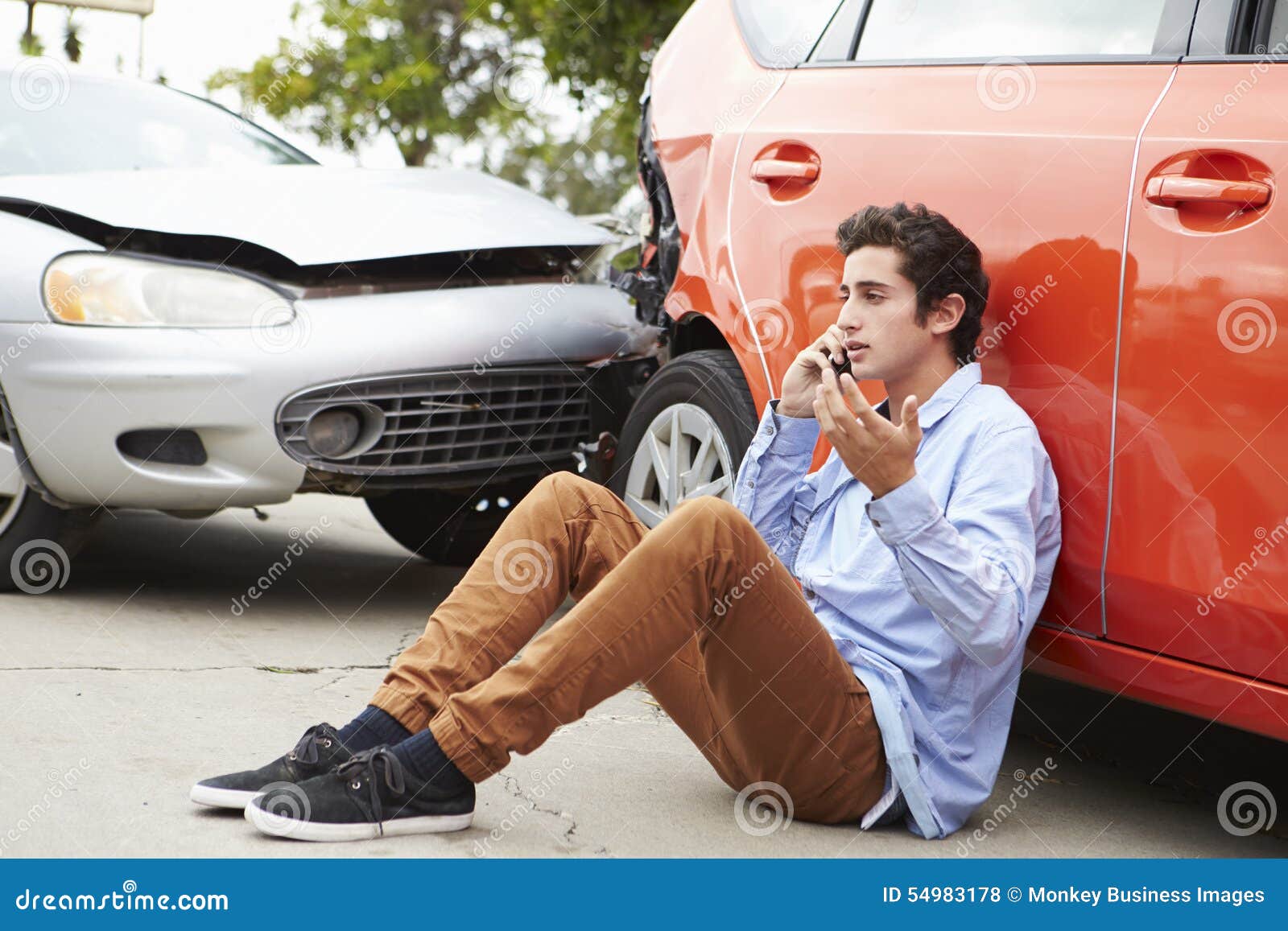 Teenage Driver Making Phone Call after Traffic Accident Stock Photo ...