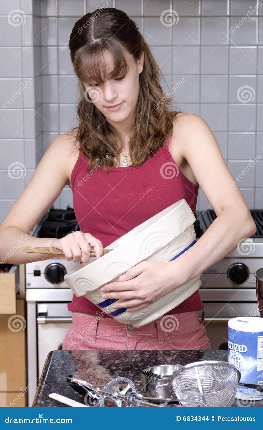 Teenage girl baking stock photo. Image of kitchen, woman - 6834344