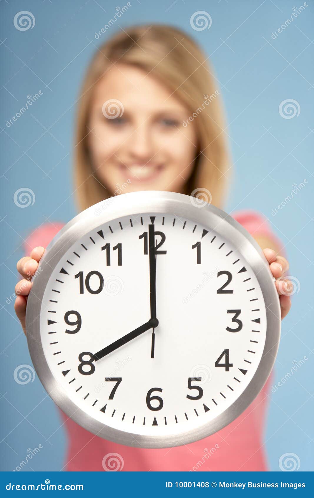 Teenage Girl Holding Clock stock photo. Image of teen - 10001408