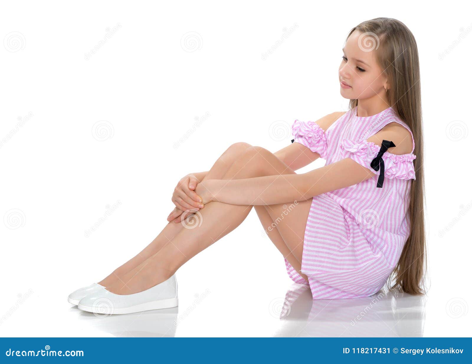 A Teenage Girl Is Sitting On The Floor Stock Image Image Of