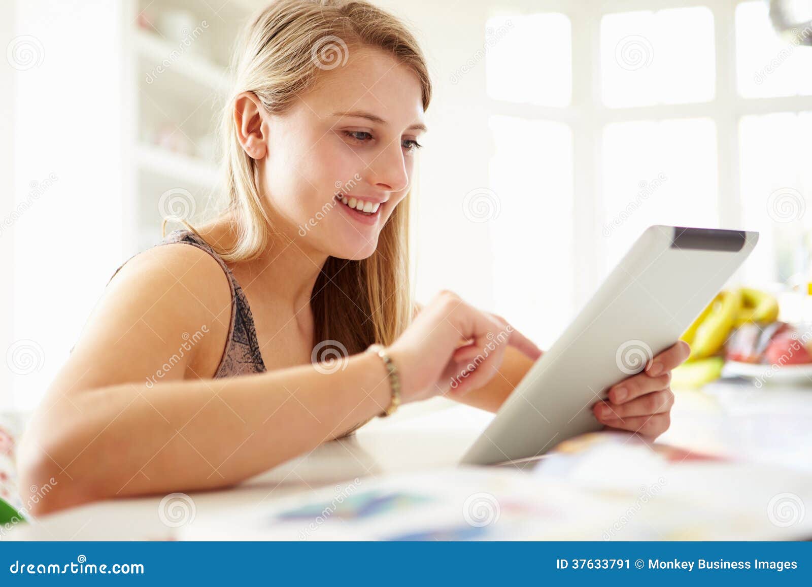 Teenage Girl Studying Using Digital Tablet at Home Stock Image - Image ...