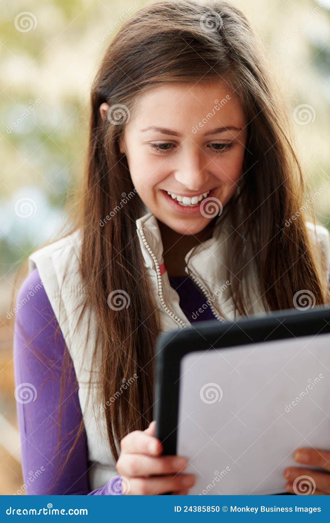 Teenage Girl Using Tablet Computer Outdoors Stock Photo - Image of ...