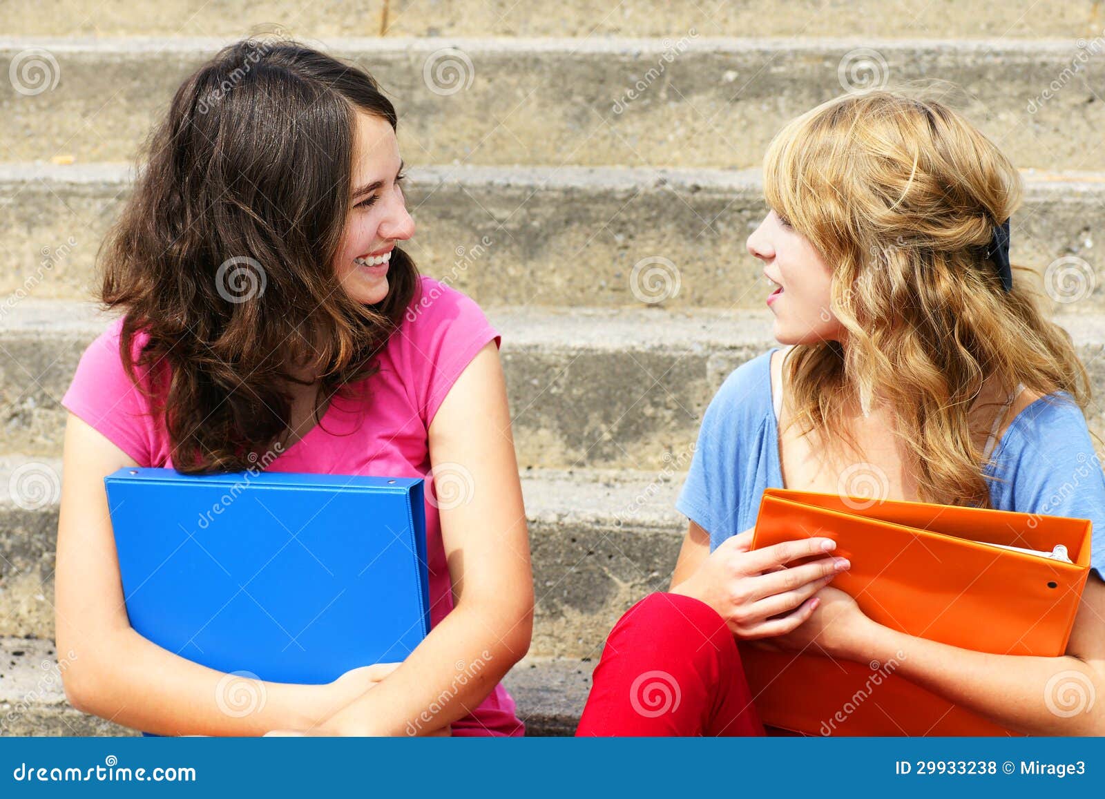 Girlfriends talking stock photo. Image of happy, book - 29933238