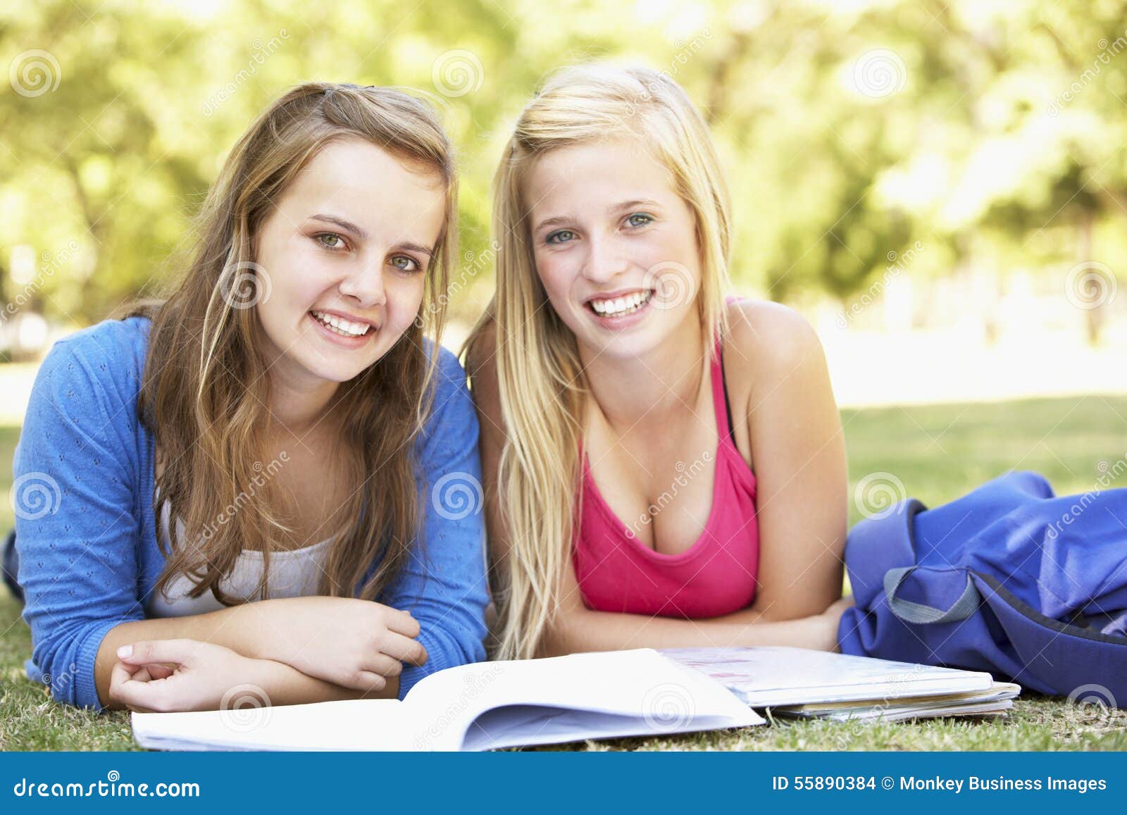 Teenage Girls Studying in Park Stock Photo - Image of caucasian, casual ...