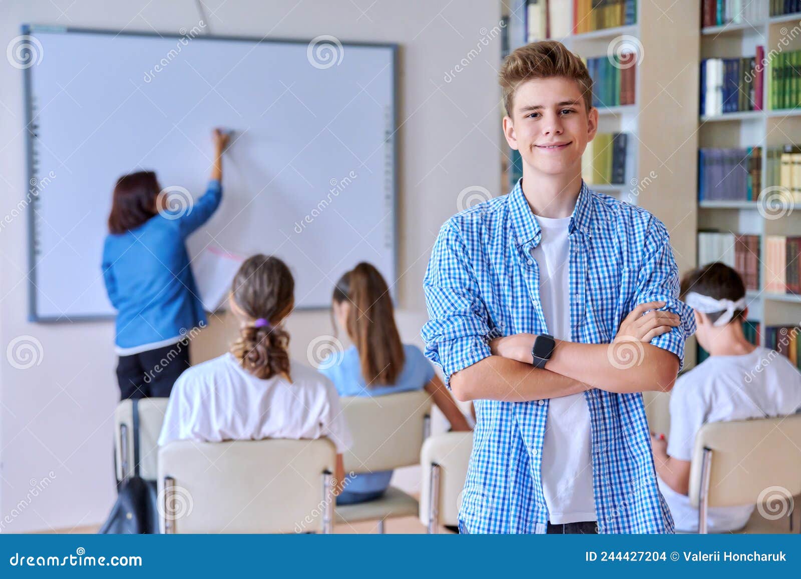Teenage Guy in the Classroom Looking at the Camera Stock Photo - Image ...