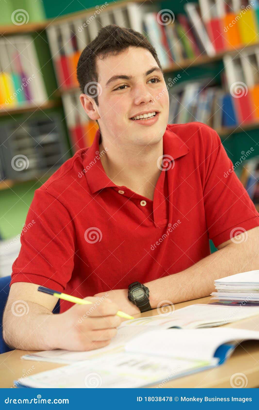 Teenage Male Student in Working in Classroom Stock Photo - Image of ...