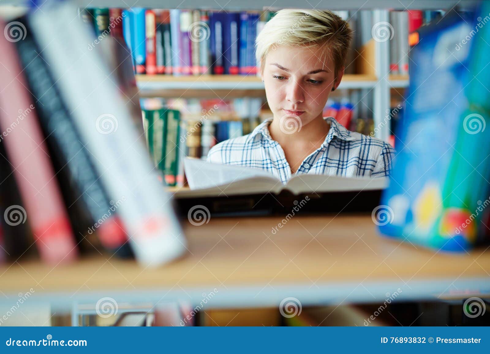 Teenage reader stock photo. Image of book, education - 76893832