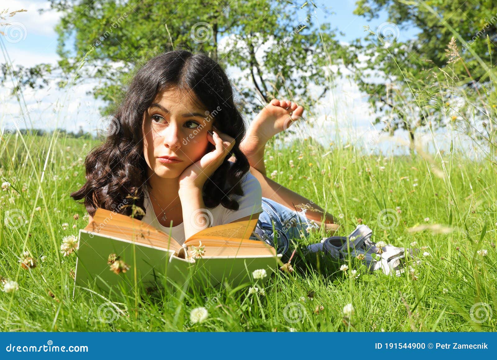 Teenage Schoolgirl Reading Book in Grass Stock Photo - Image of ... Teenage Schoolgirl Reading Book in Grass Stock Photo - Image of ...