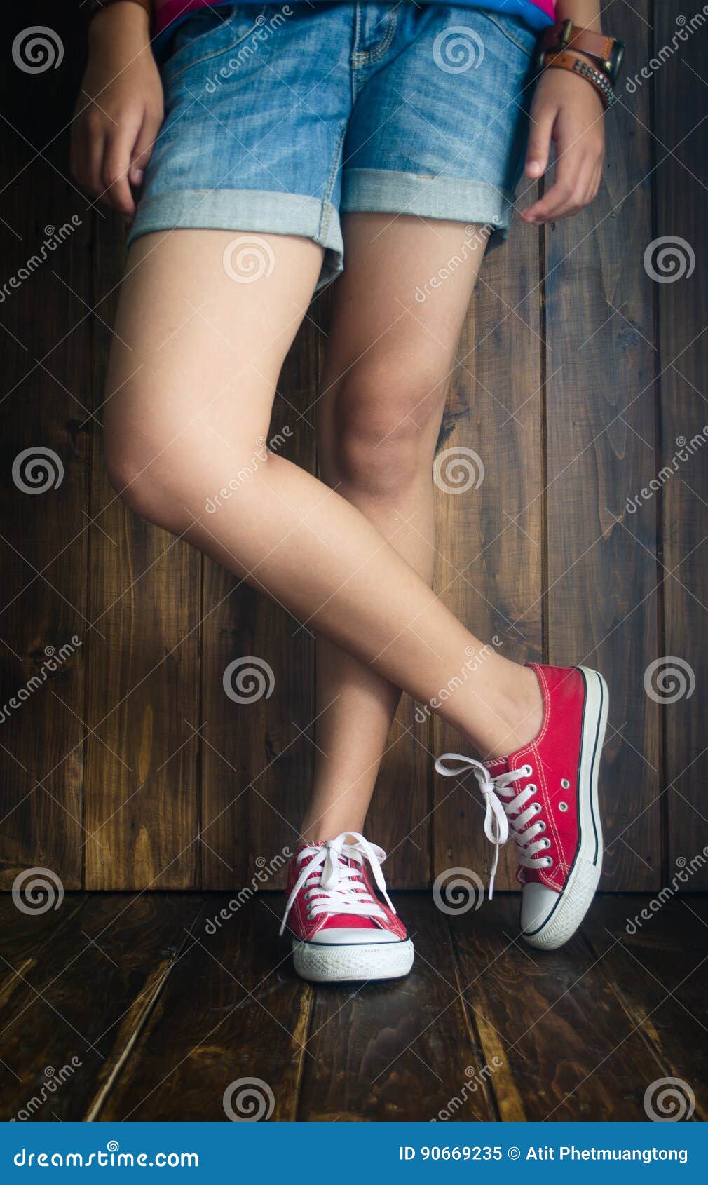 Teenage Standing Poses Focus Leg Stock Photo | CartoonDealer.com #90669342