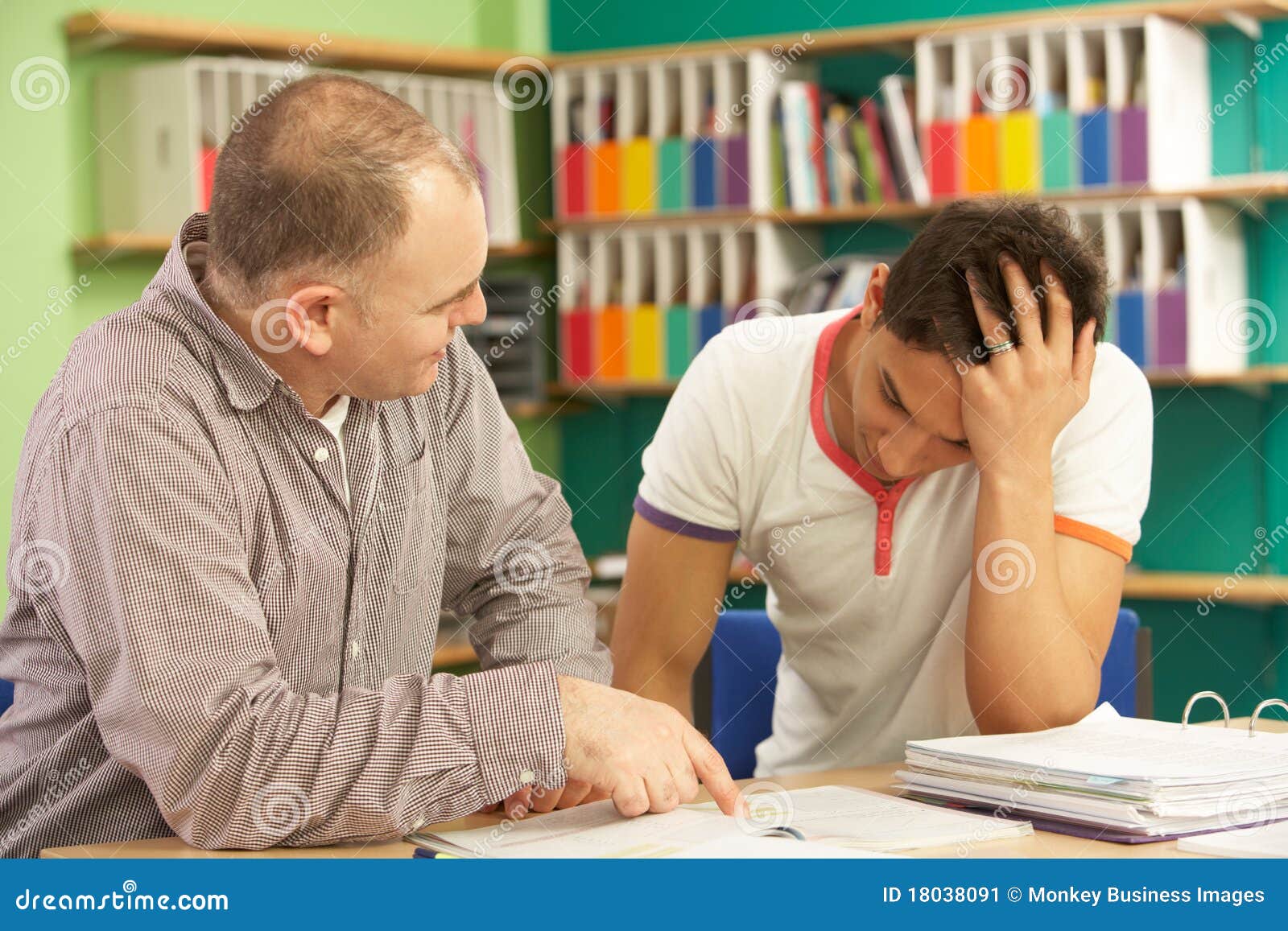 Teenage Student in Classroom with Tutor Stock Image - Image of clothing ...