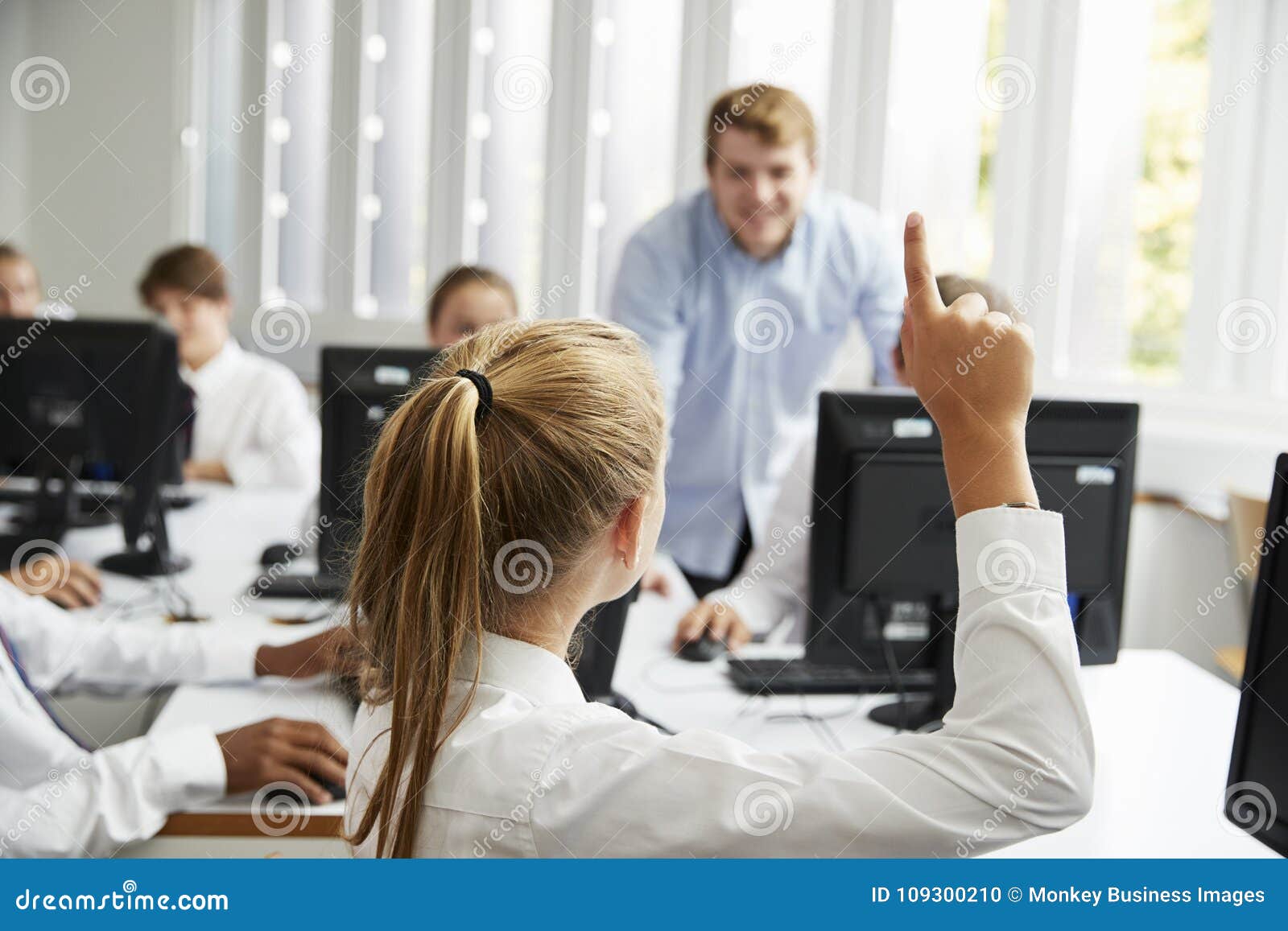 Teenage Students Asking Teacher Question in it Class Stock Photo ...