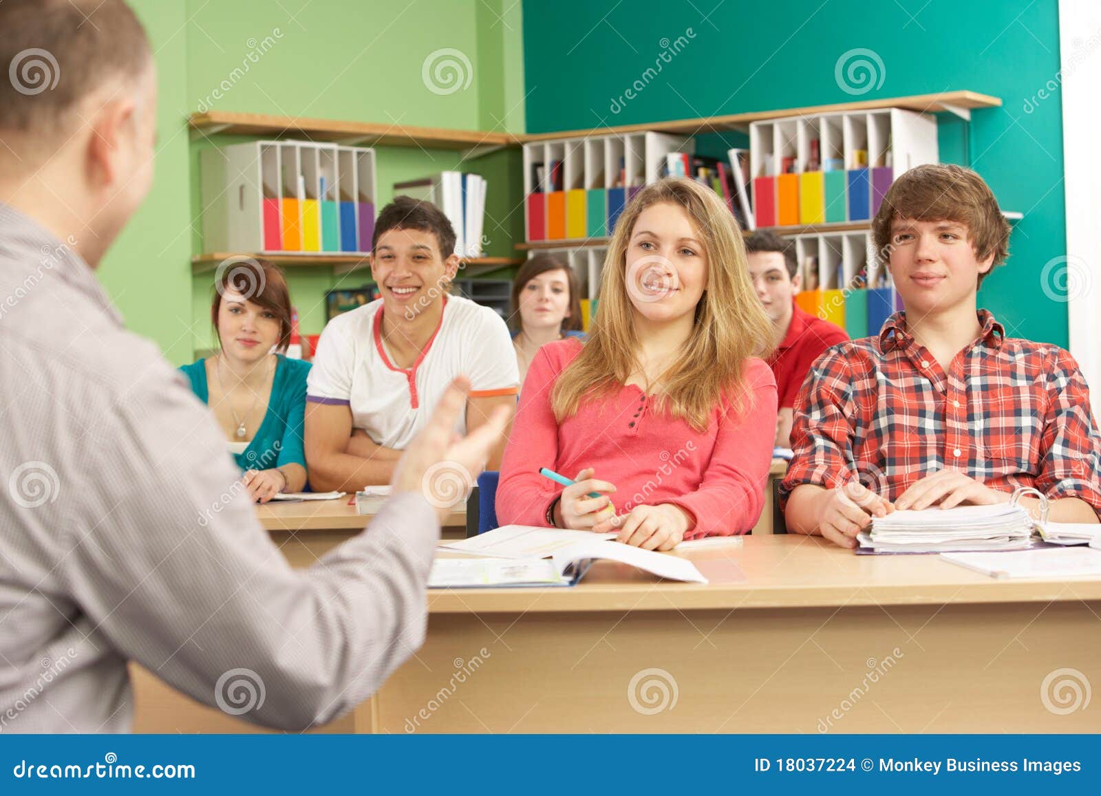 Teenage Students Studying in Classroom with Tutor Stock Photo - Image ...