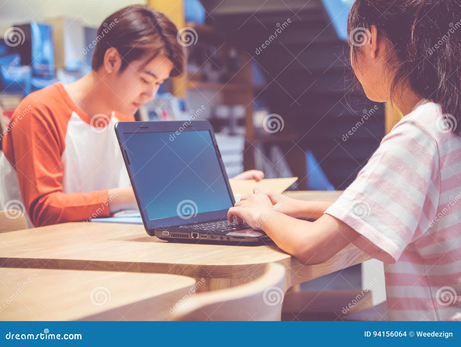 Teenage Students Studying Together Use Laptop Computer for E-learning ...