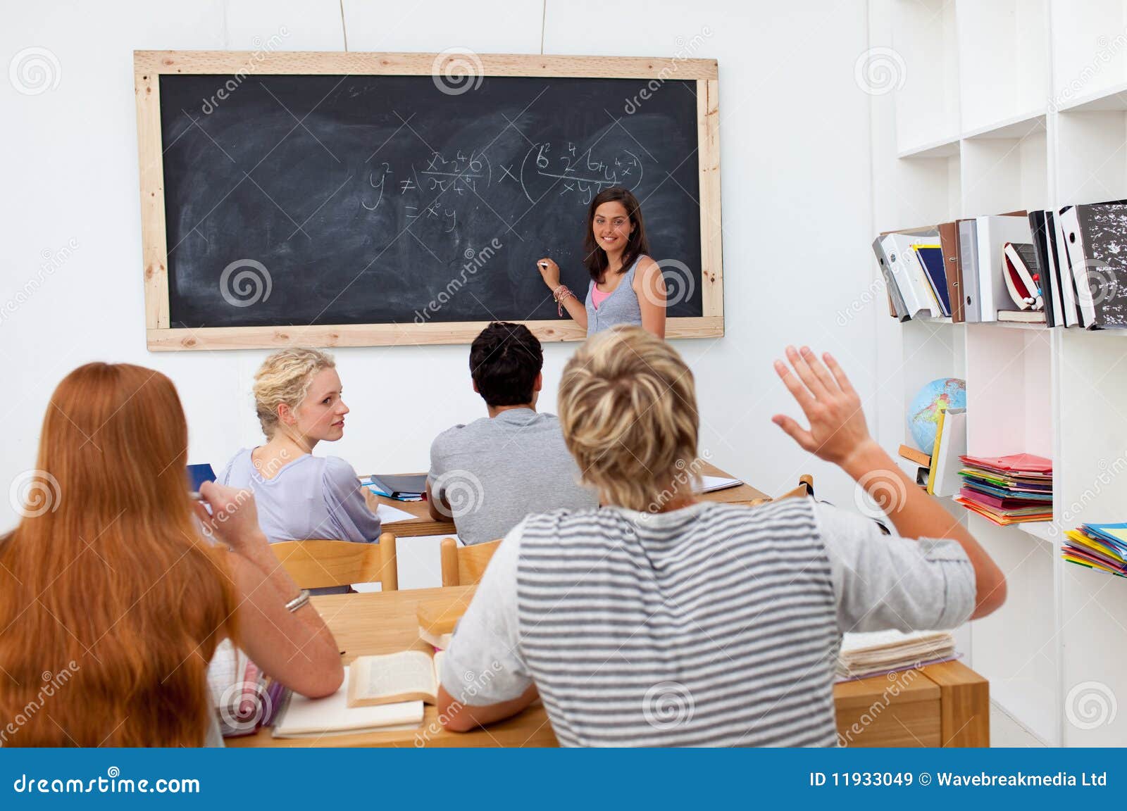 Teenager Asking a Question in the Class Stock Image - Image of ...
