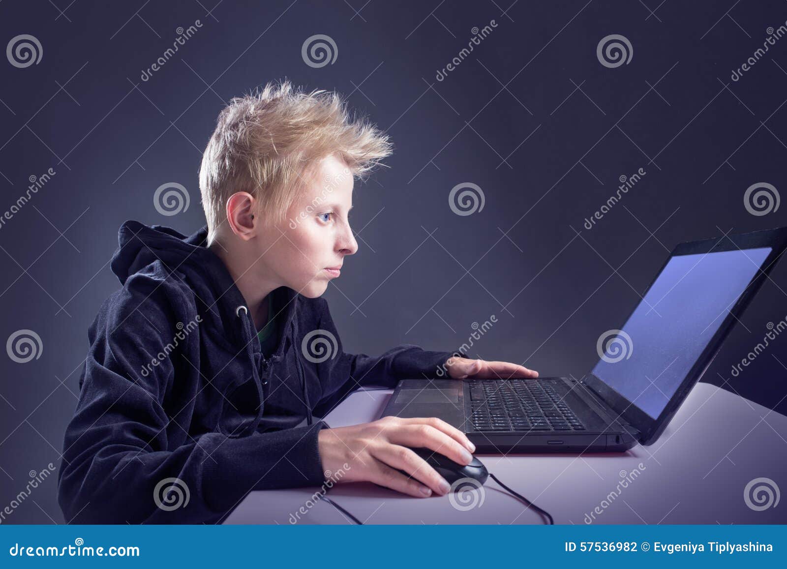 Teenager behind a computer stock photo. Image of white - 57536982