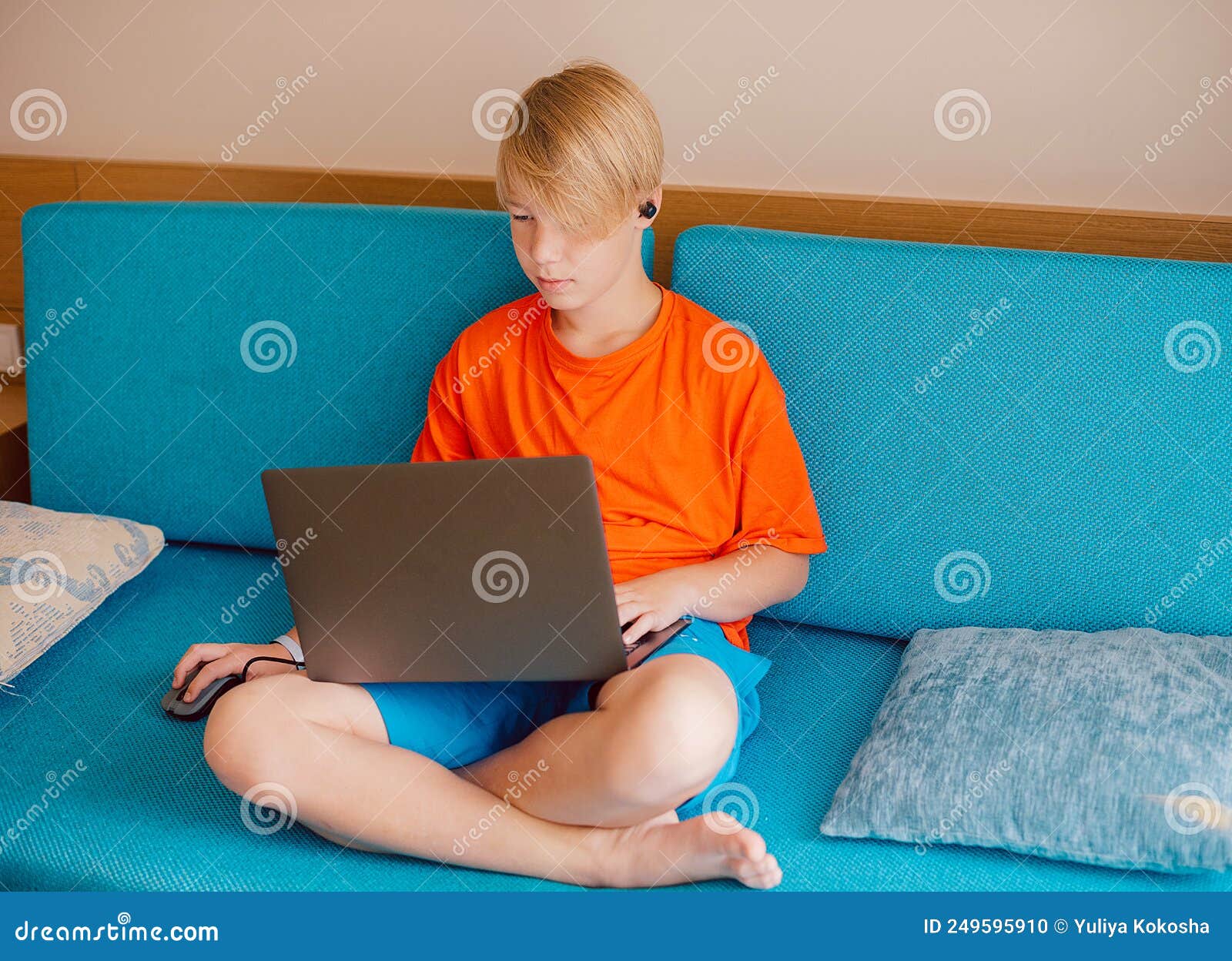 Boy playing video games stock photo. Image of casual - 249595910