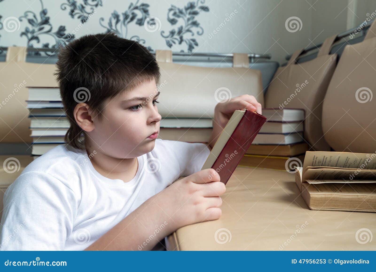 Teenager Boy Reading a Book in Room Stock Image - Image of sitting ...