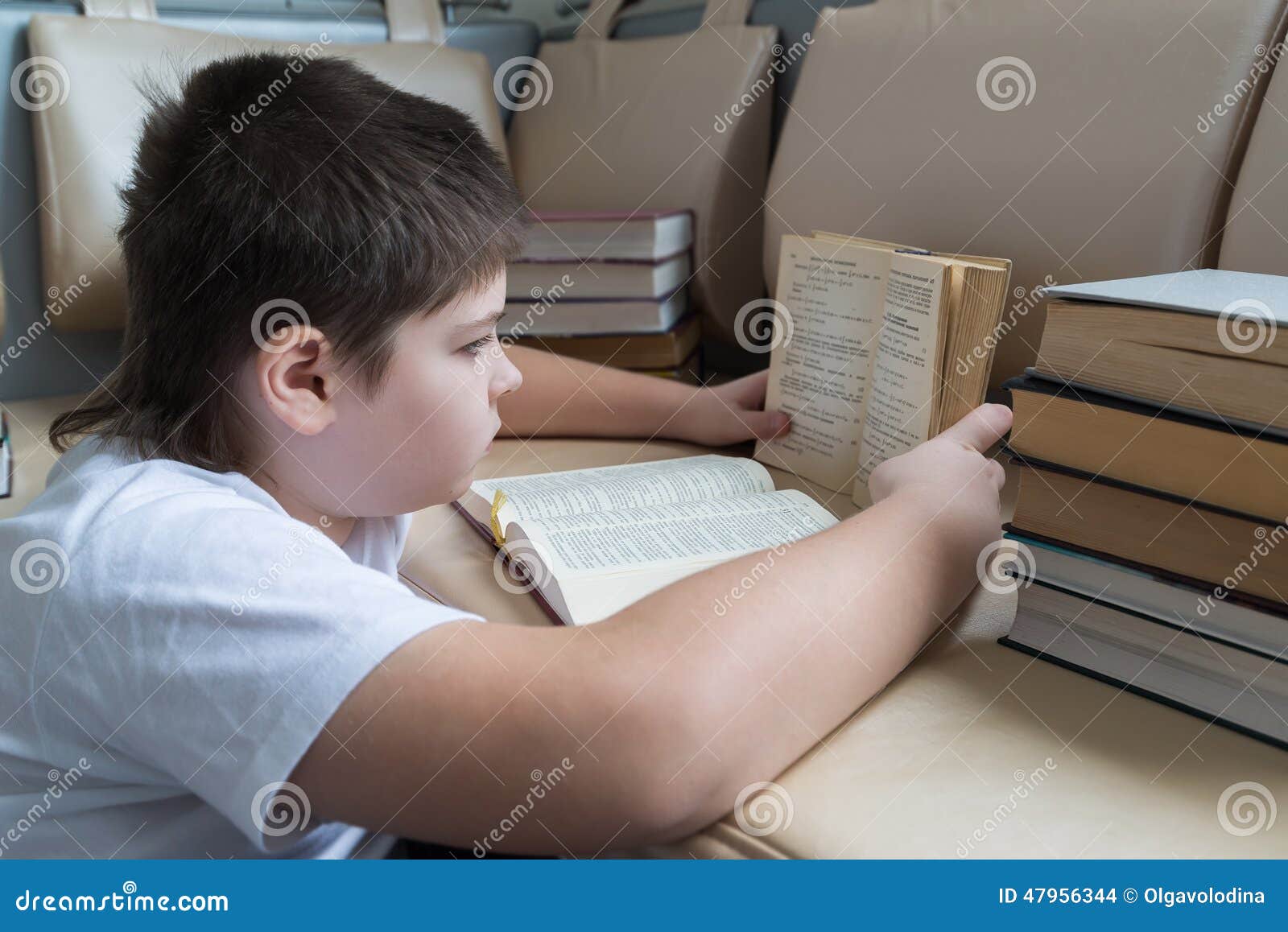 Teenager Boy Reading a Book in Room Stock Photo - Image of sofa, teen ...
