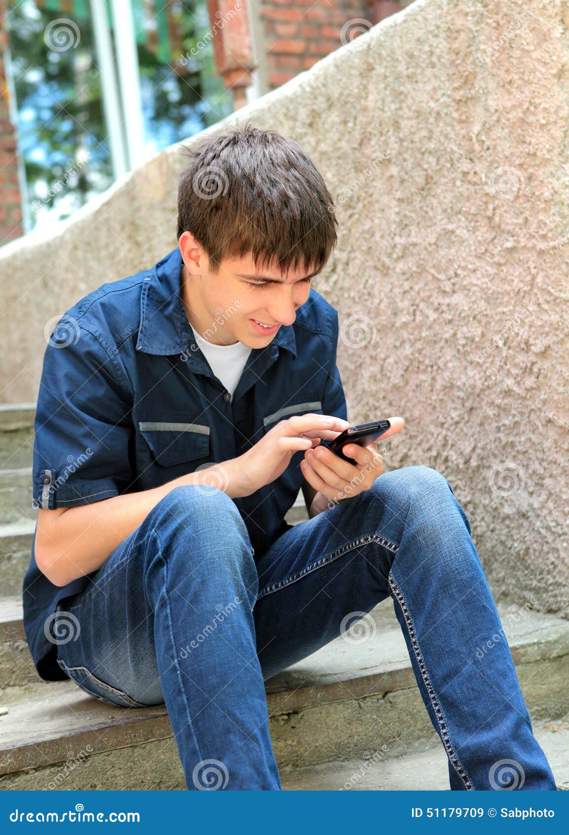 Teenager with Cellphone stock image. Image of steps, cheerful - 51179709