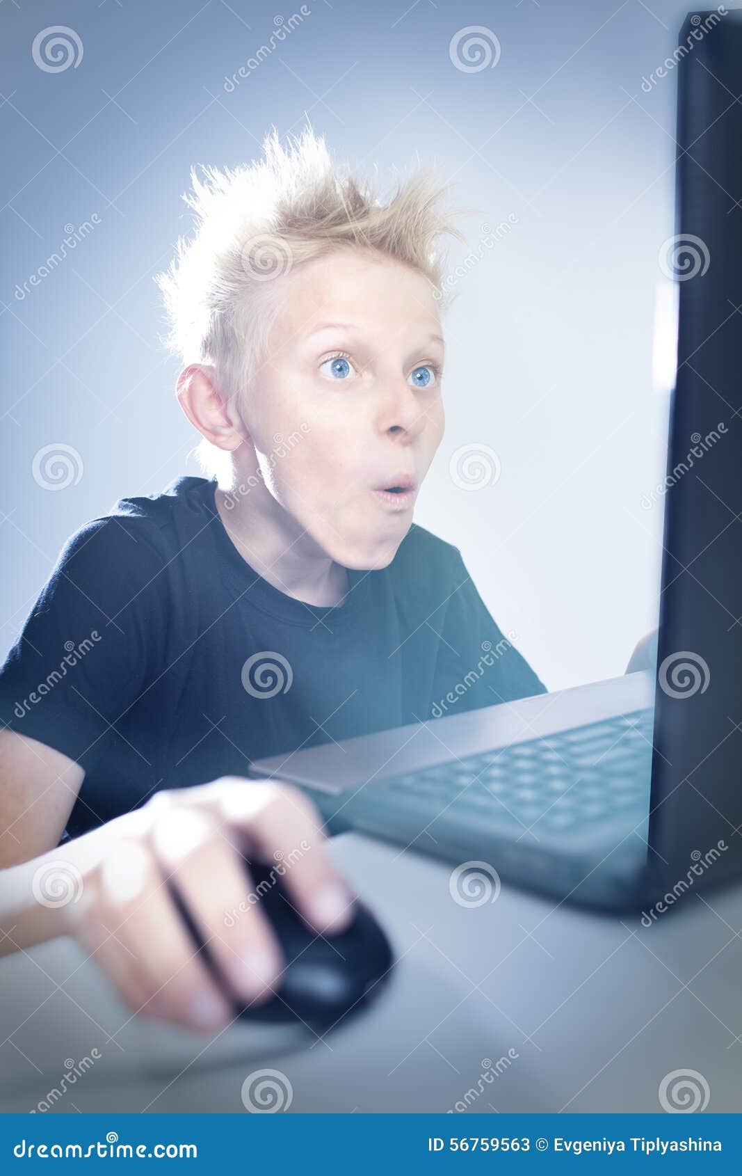Teenager at a computer stock image. Image of sitting - 56759563