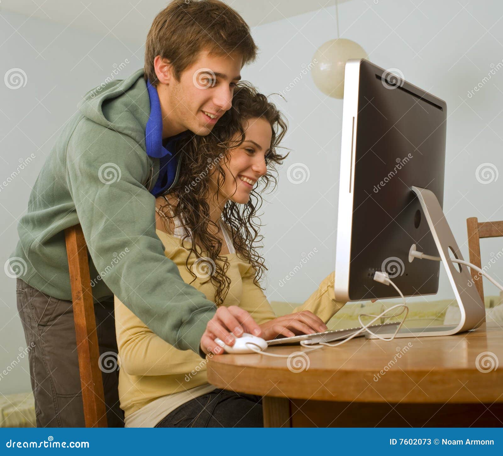 Teenager couple computer stock image. Image of smile, people - 7602073