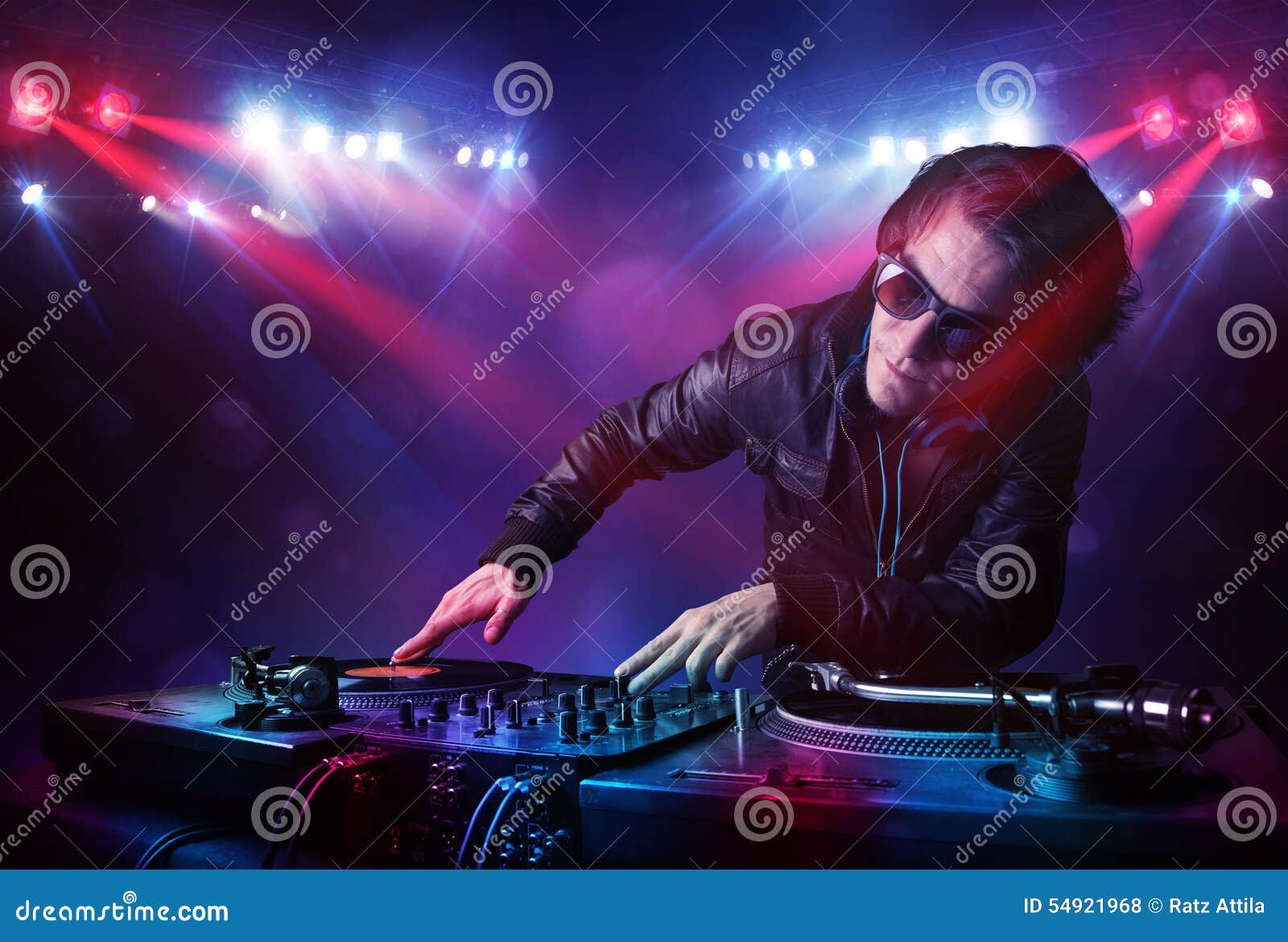 Teenager Dj Mixing Records in Front of a Crowd on Stage Stock Photo ...