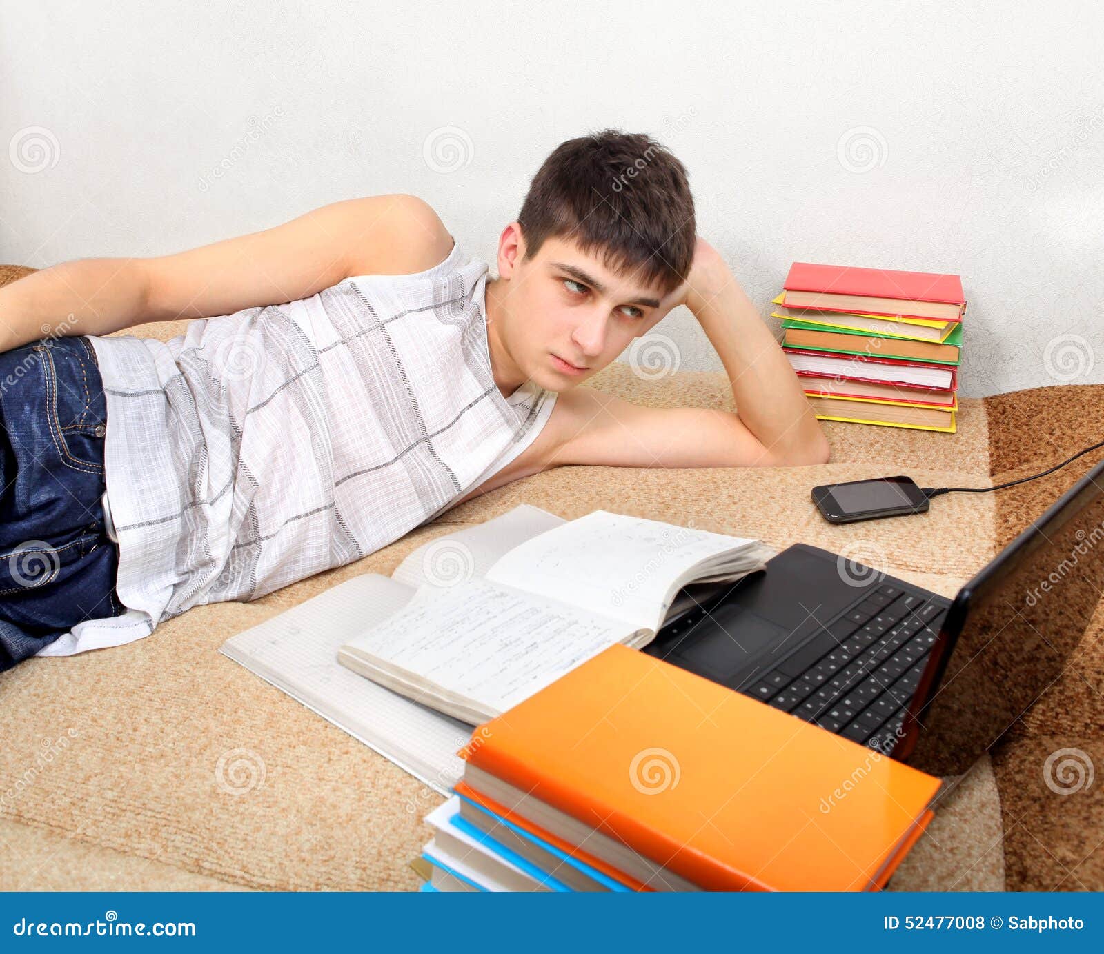 Teenager doing Homework stock photo. Image of examination - 52477008