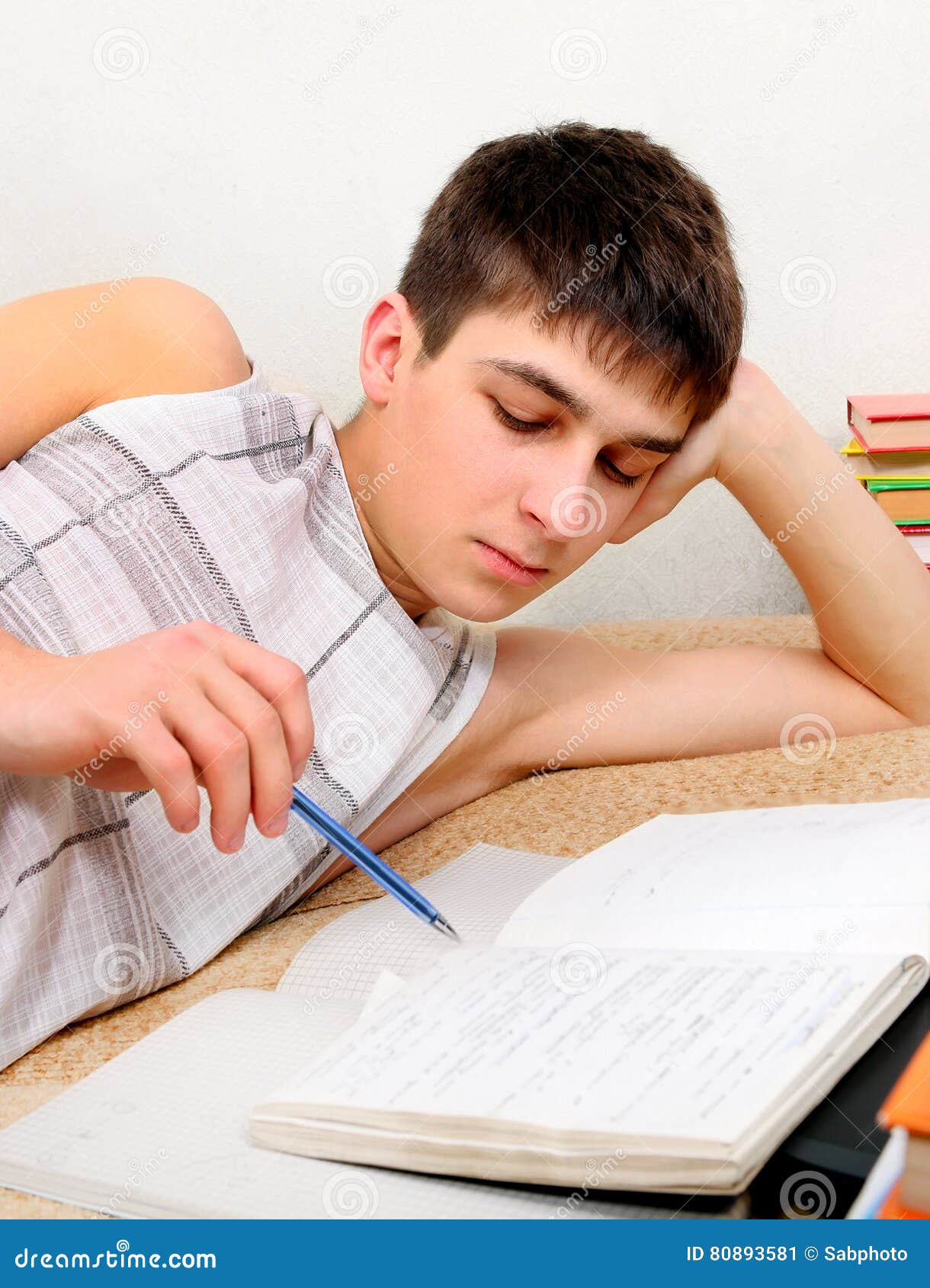 Teenager doing Homework stock image. Image of outwork - 80893581