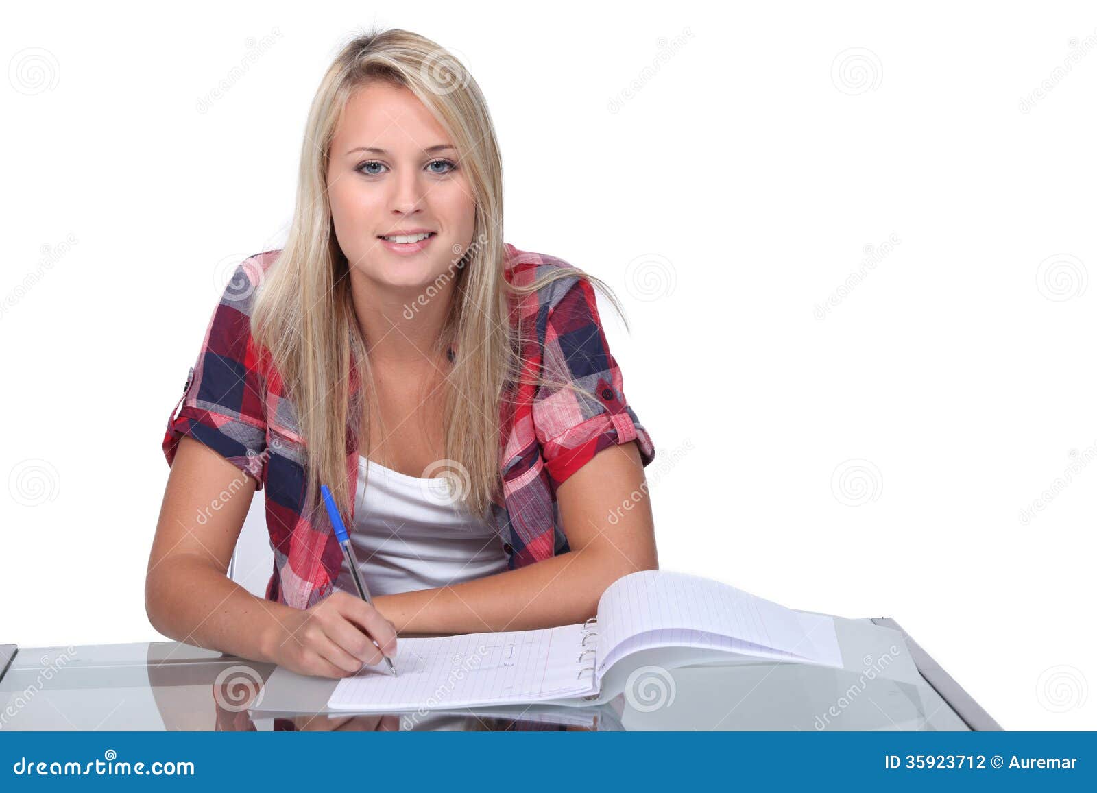 Teenager doing homework stock photo. Image of writing - 35923712