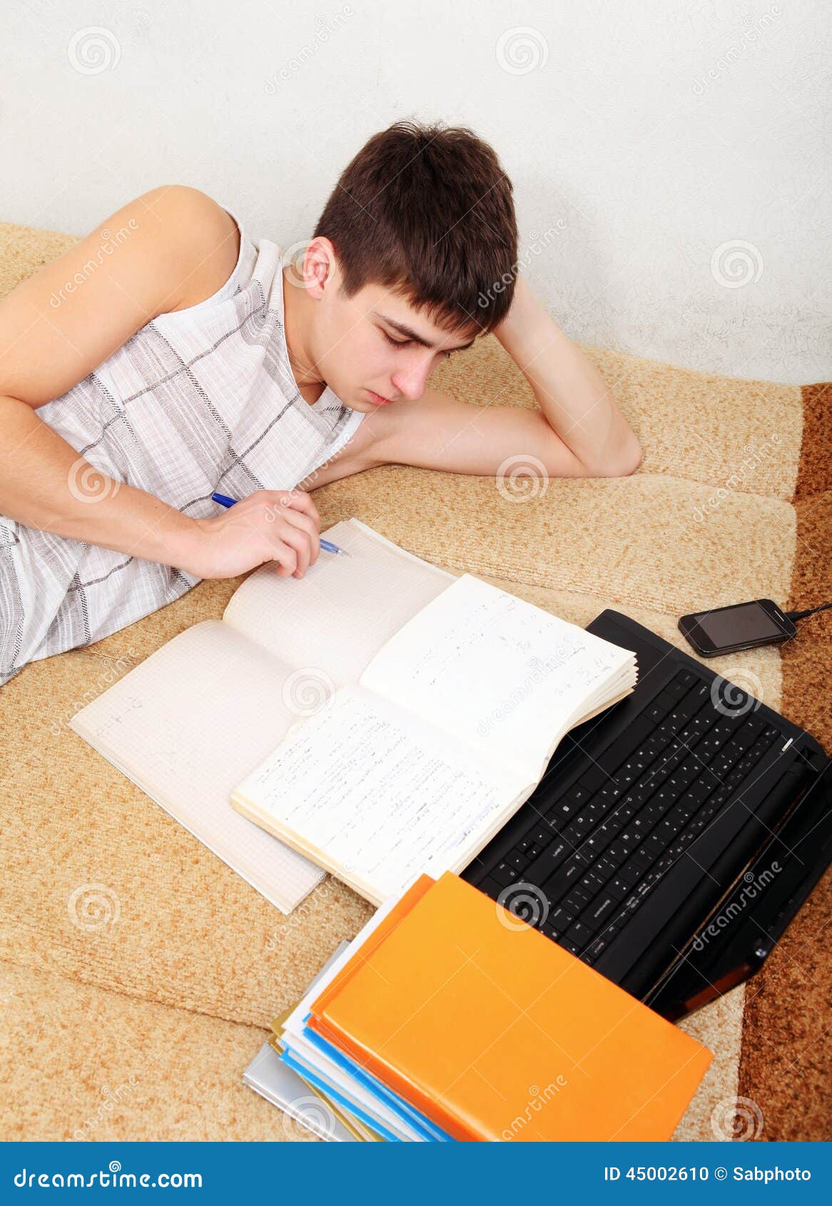 Teenager doing Homework stock photo. Image of prepare - 45002610