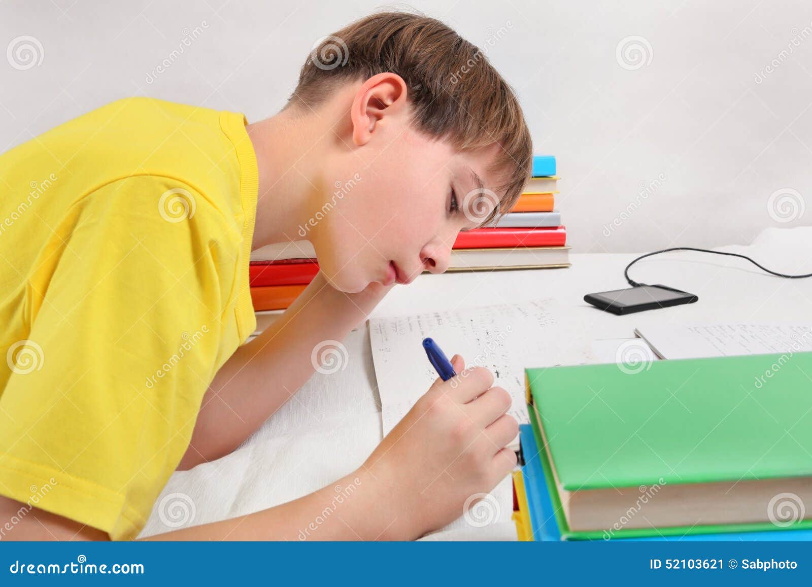 Teenager doing Homework stock image. Image of student - 52103621