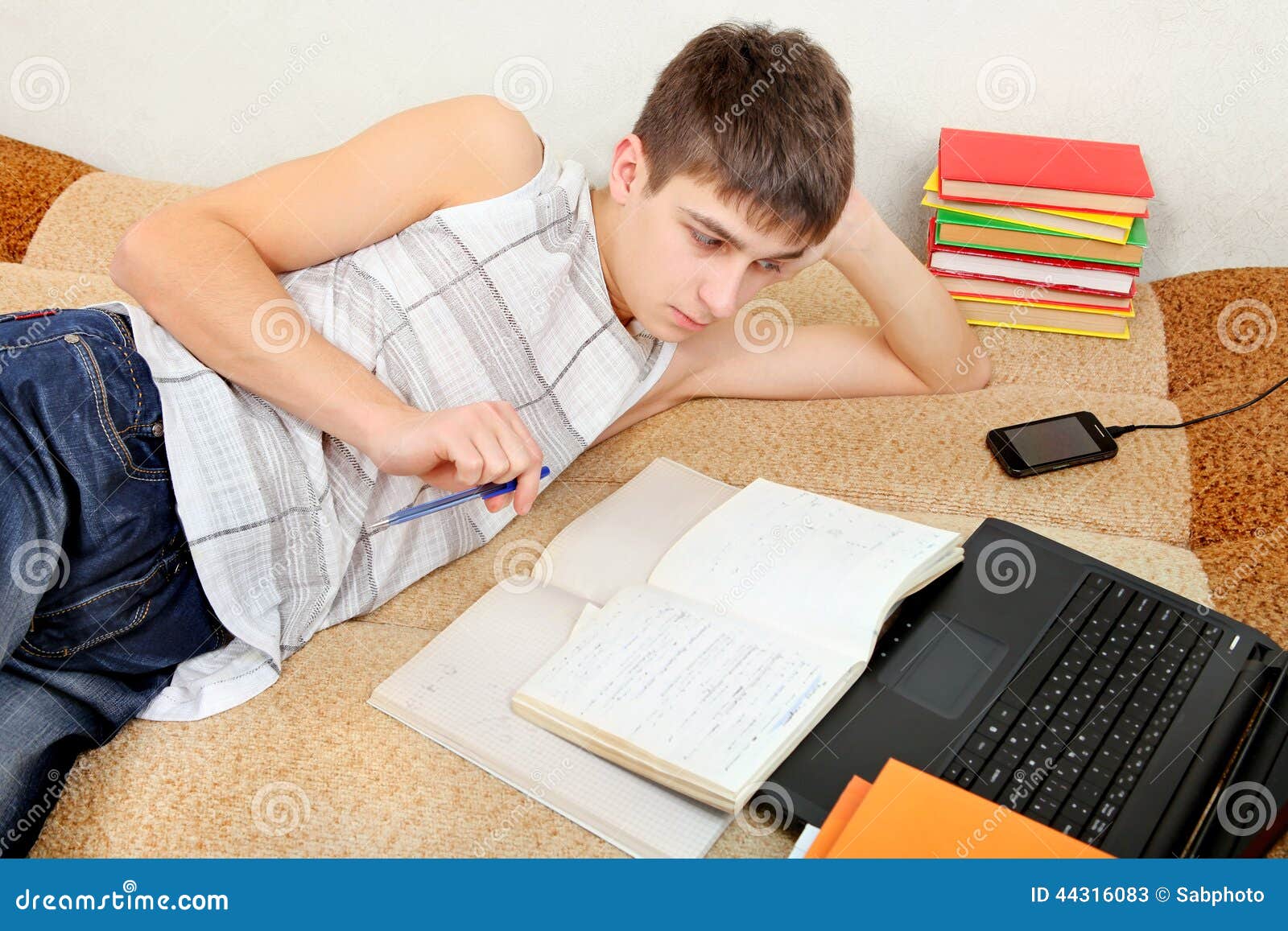 Teenager doing Homework stock image. Image of homework - 44316083