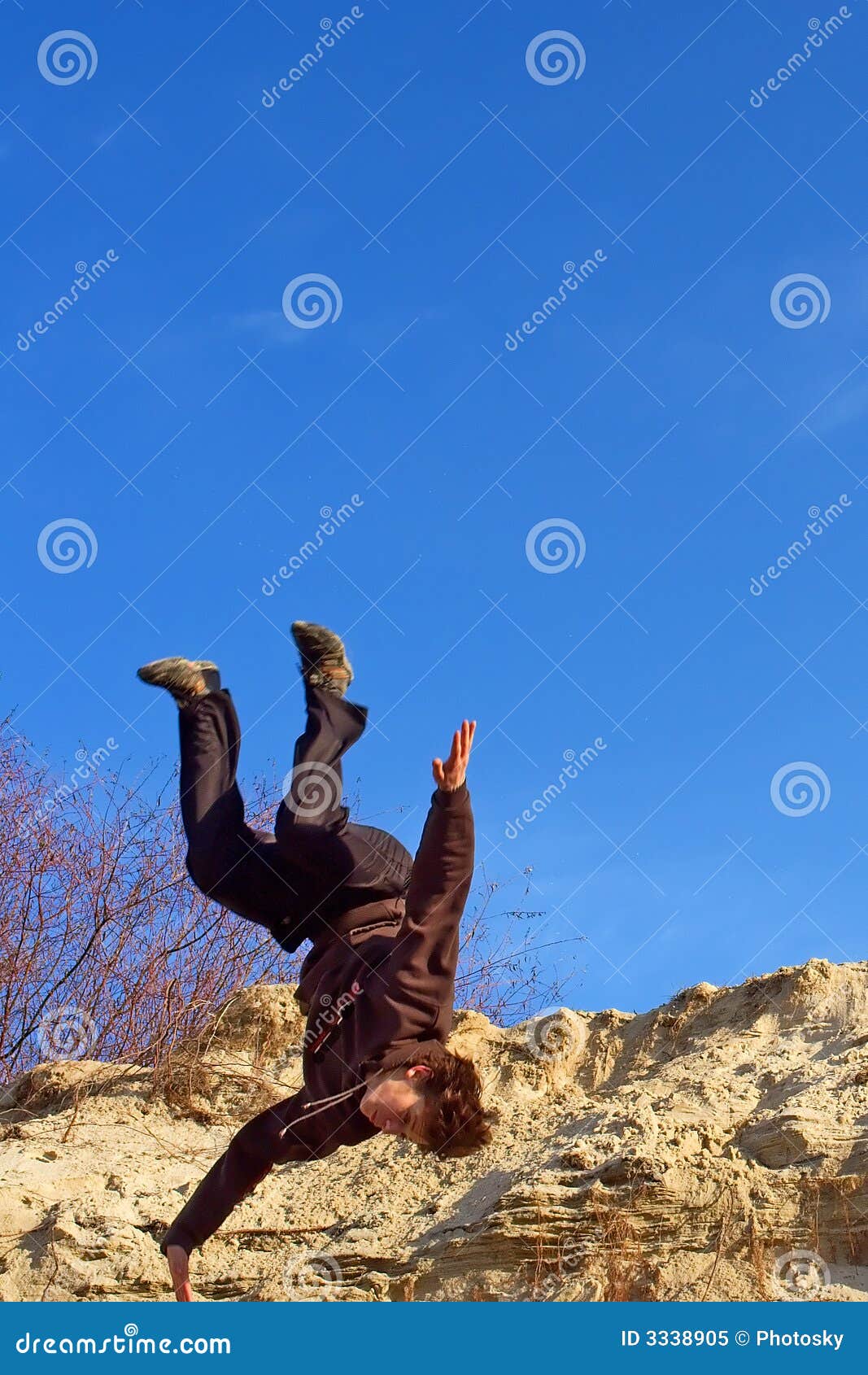 Teenager doing somersault stock image. Image of jump, hand - 3338905