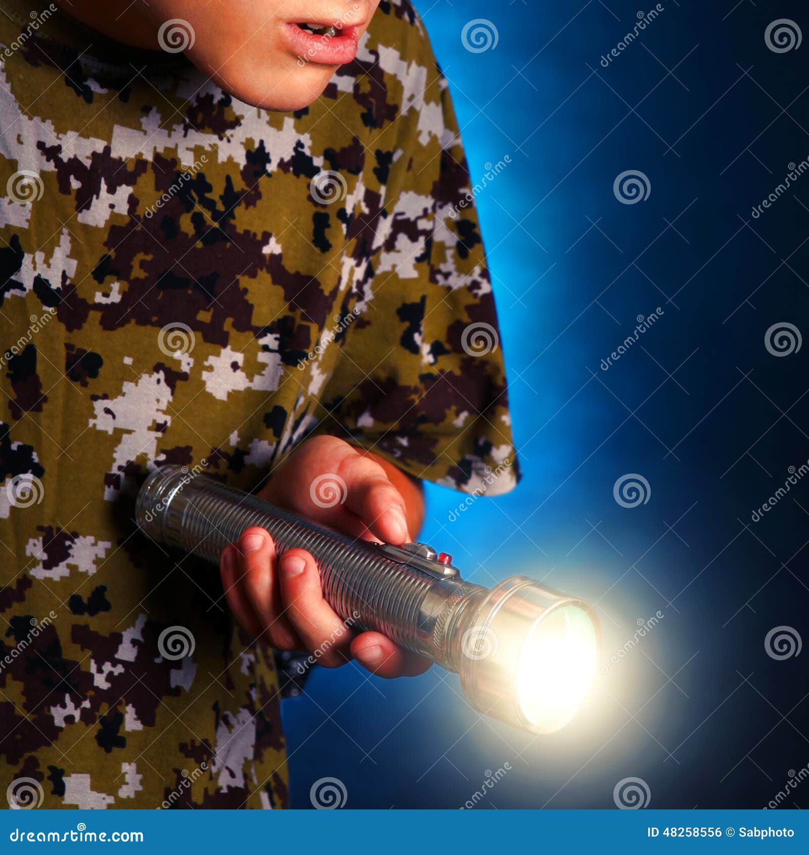 Teenager with Flashlight stock photo. Image of stare - 48258556