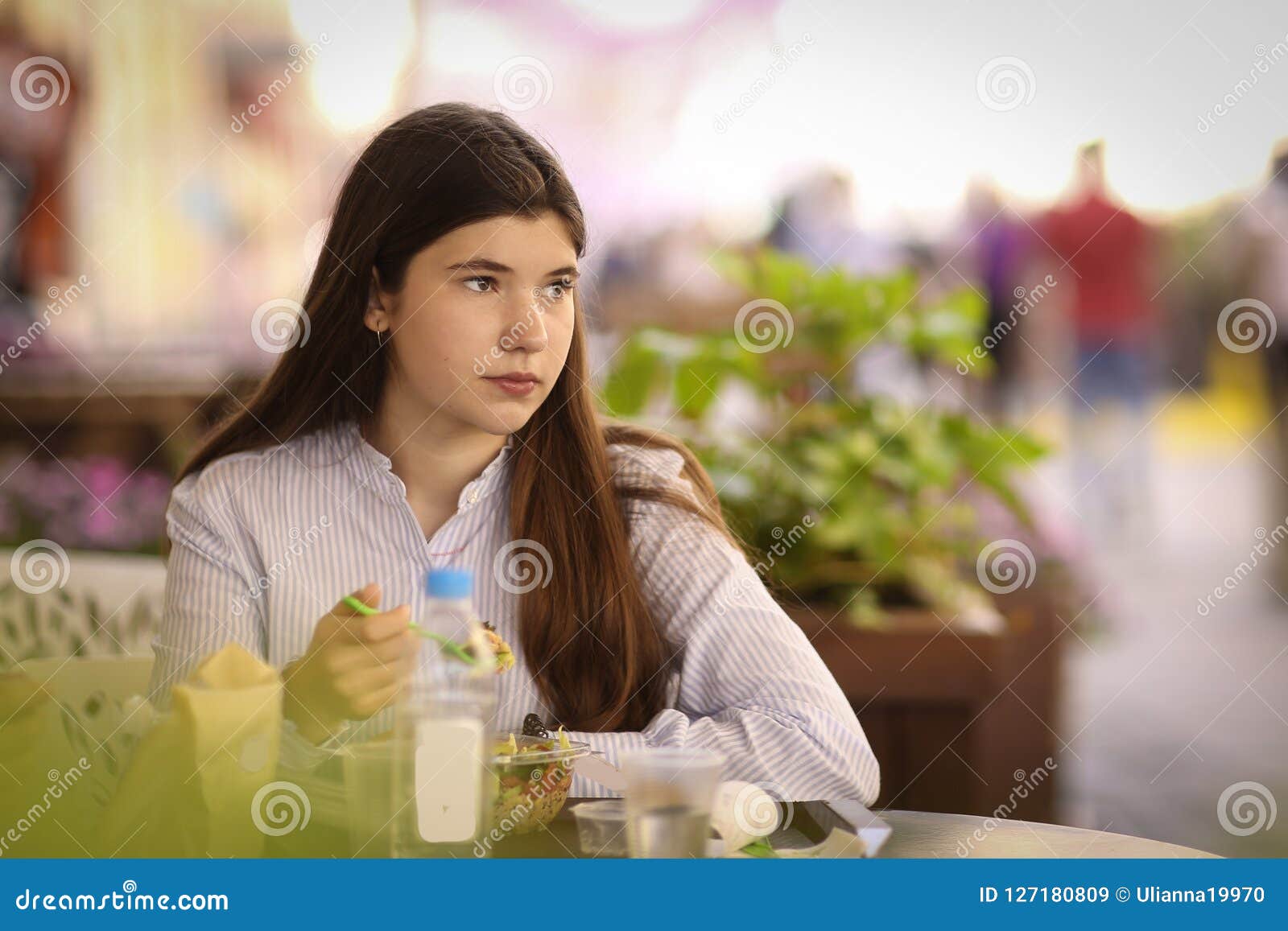 Teenager Girl On Lunch Break Sit In Summer Outdoor Cafe Stock Image