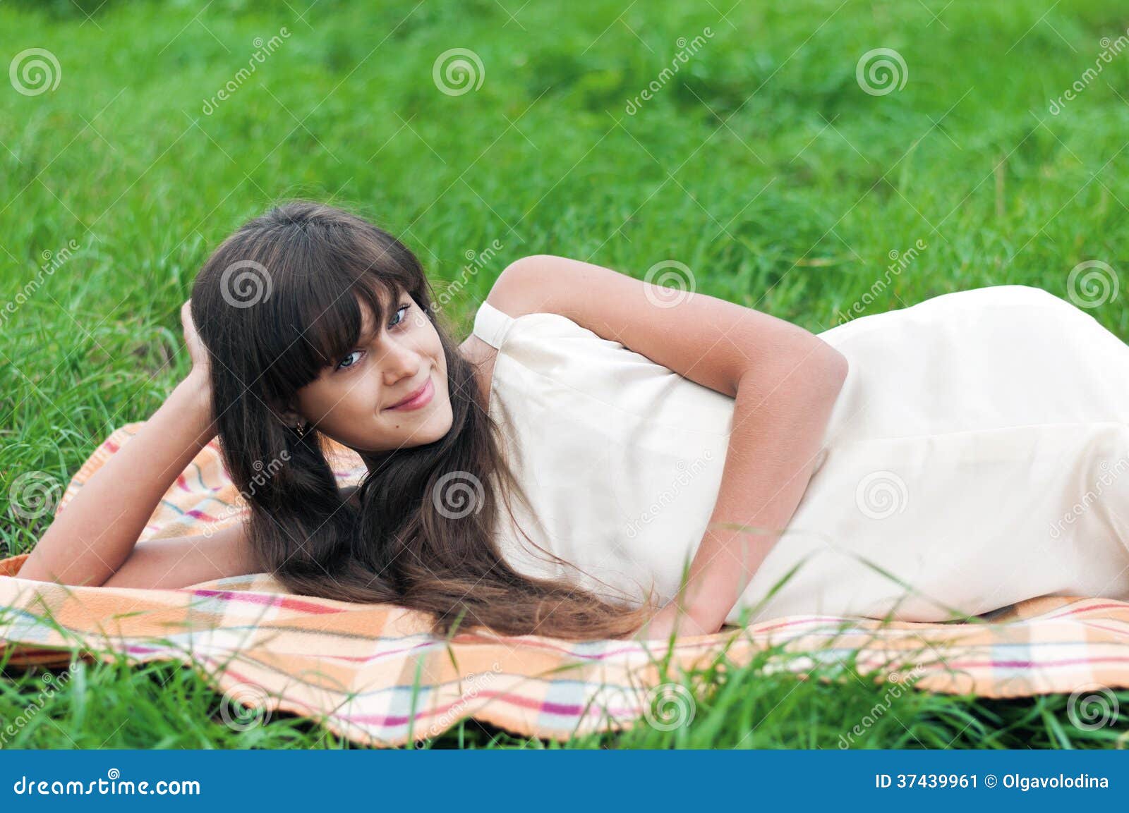 Teenager Girl Lying on Grass Stock Image - Image of plaid, brunette ...