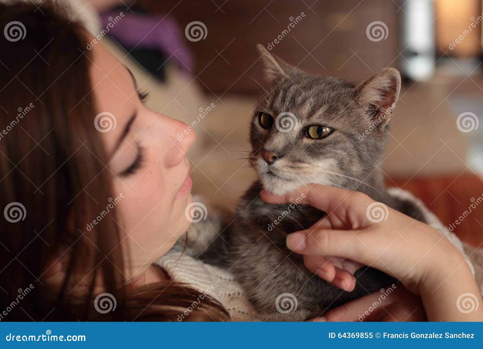 Teenager with her cat stock image. Image of animal, love - 64369855