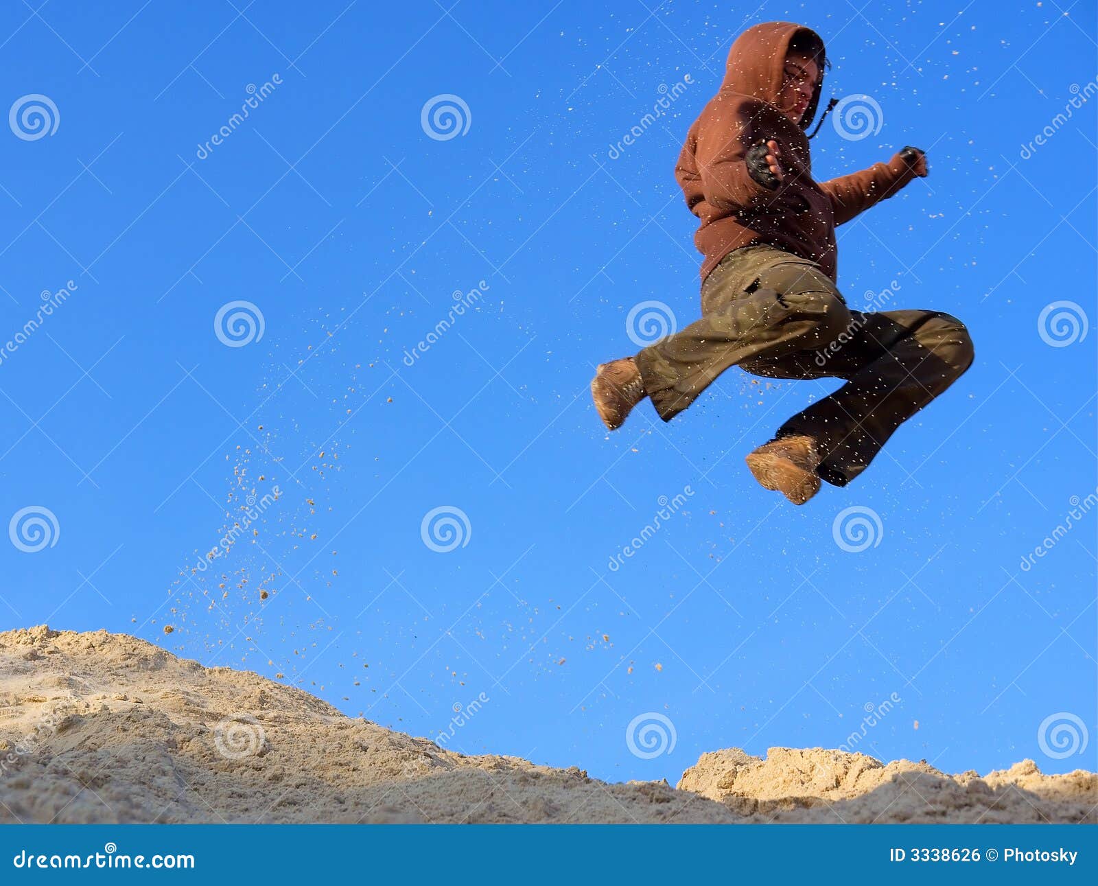 Teenager jumps on sand stock photo. Image of brave, extreme - 3338626