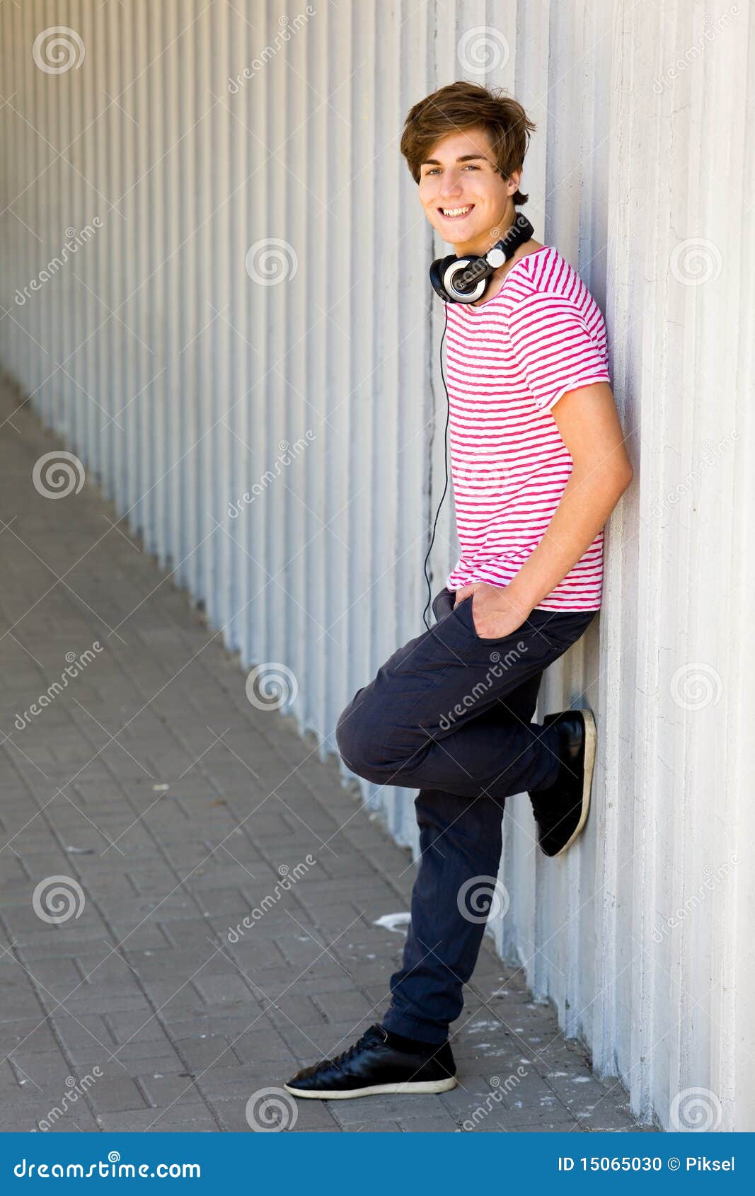 Teenager Leaning Against Wall Stock Photo - Image of teens, teen: 15065030