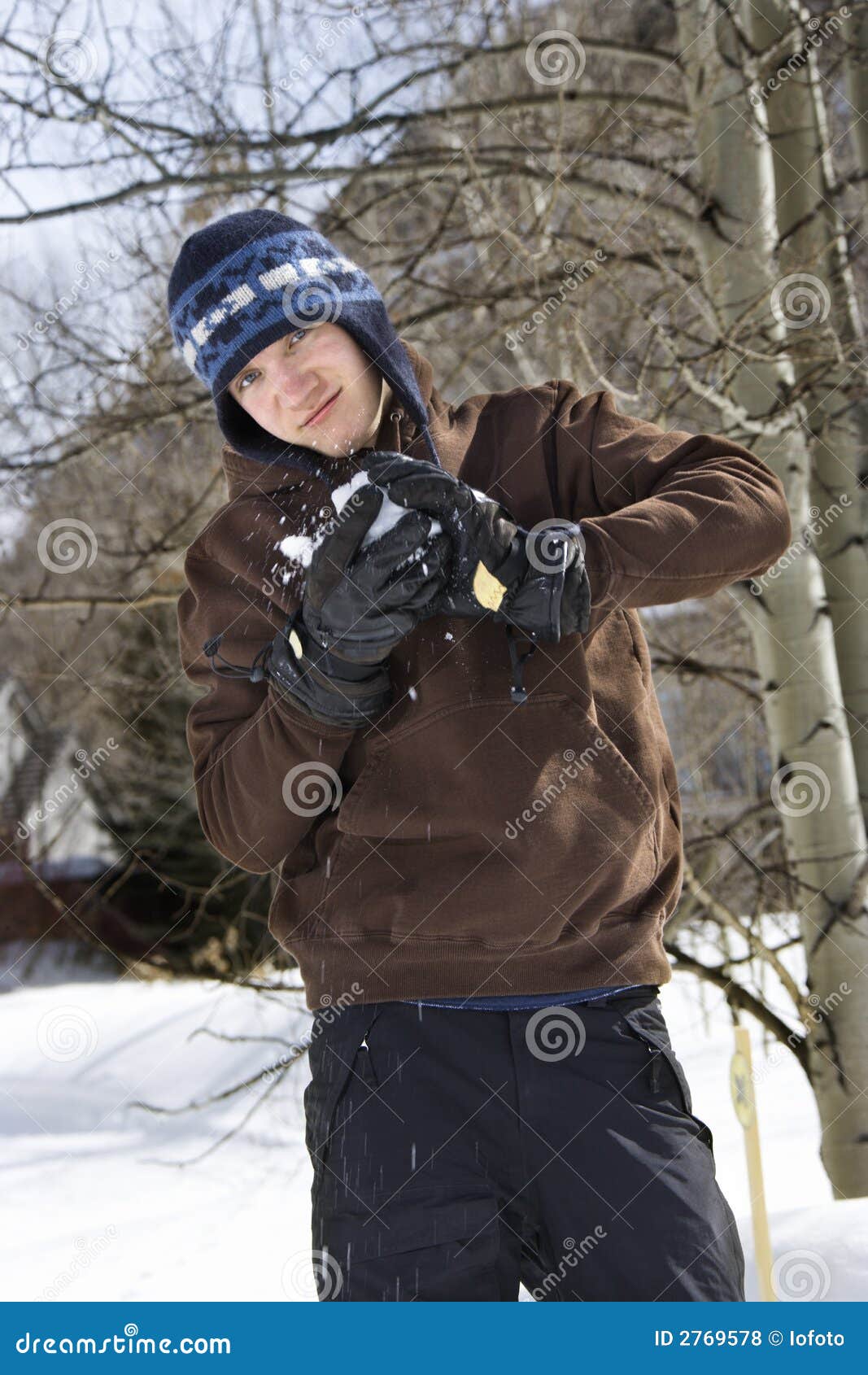 Teenager making snowball stock photo. Image of teen, young - 2769578