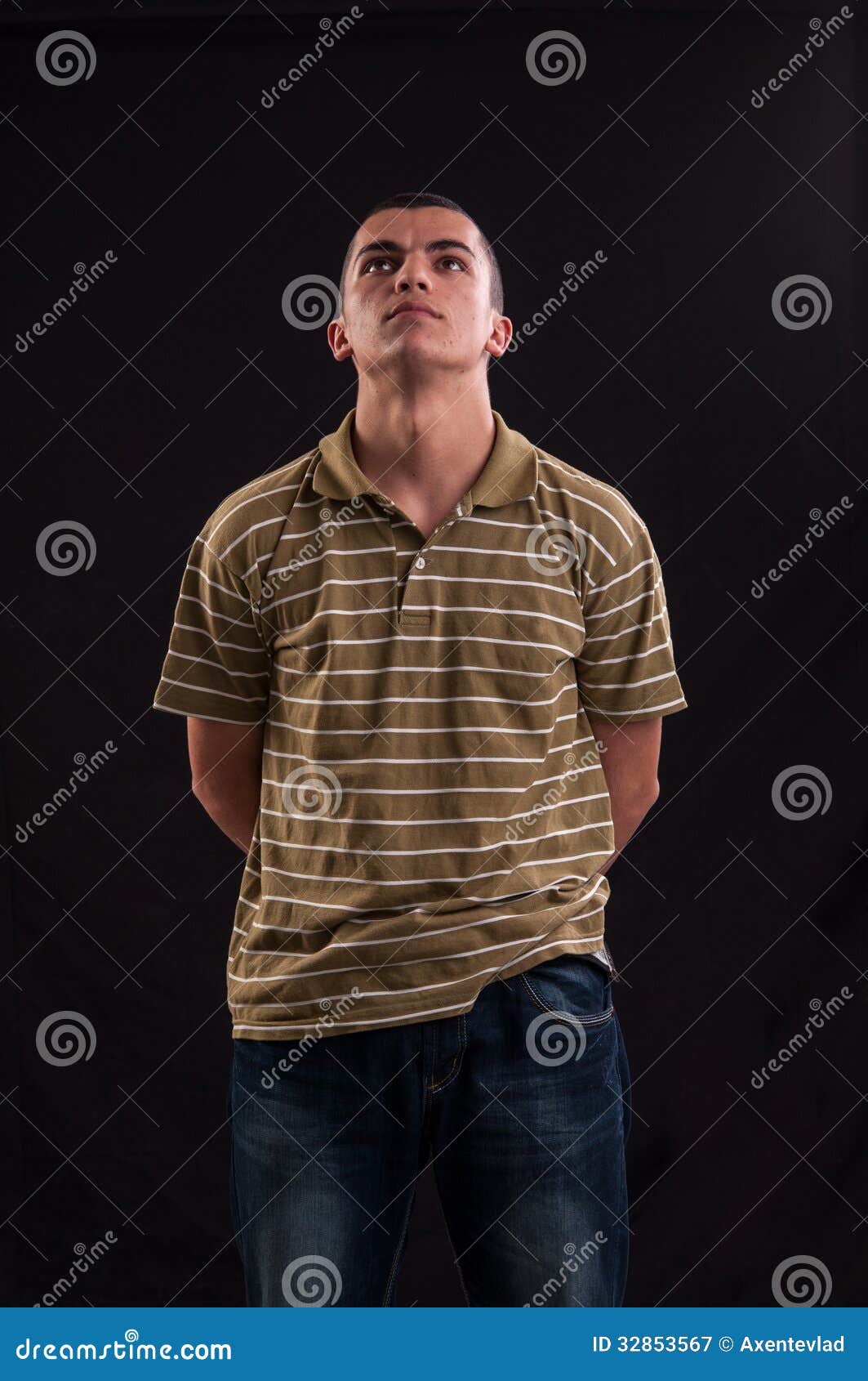 Teenager with Pensive Expression Looking Up Stock Image - Image of male ...