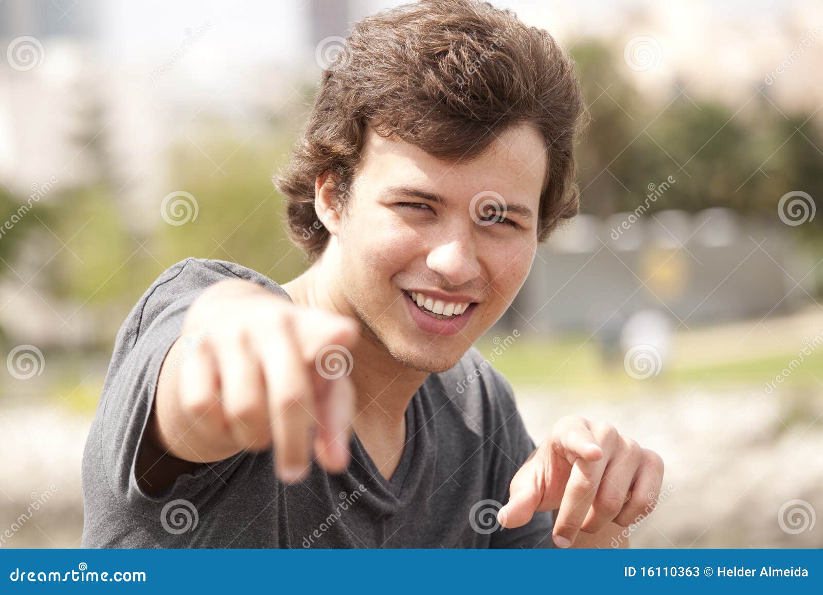 Teenager pointing to you stock image. Image of emotion - 16110363