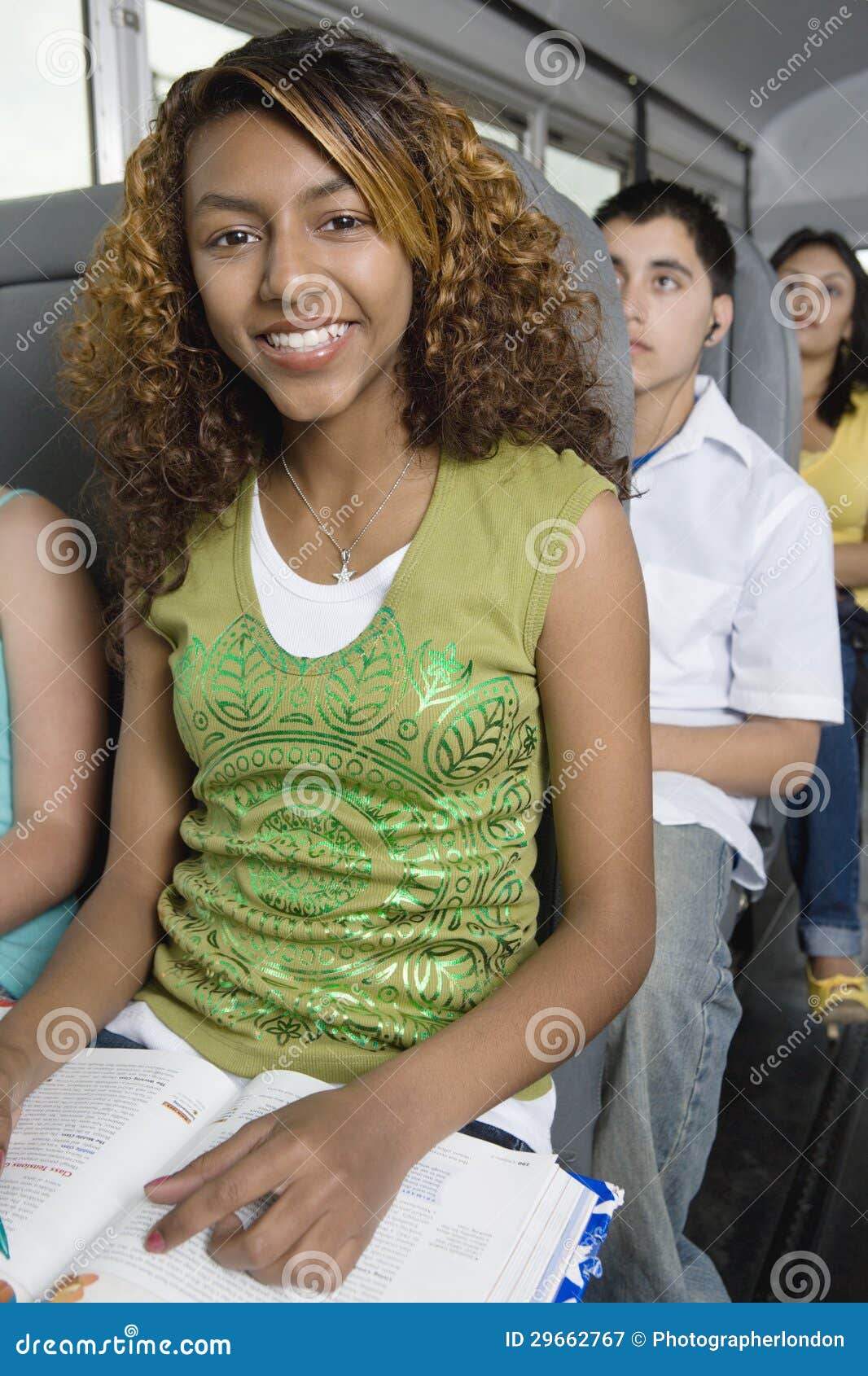 Teenager Reading Textbook in School Bus Stock Image - Image of ...