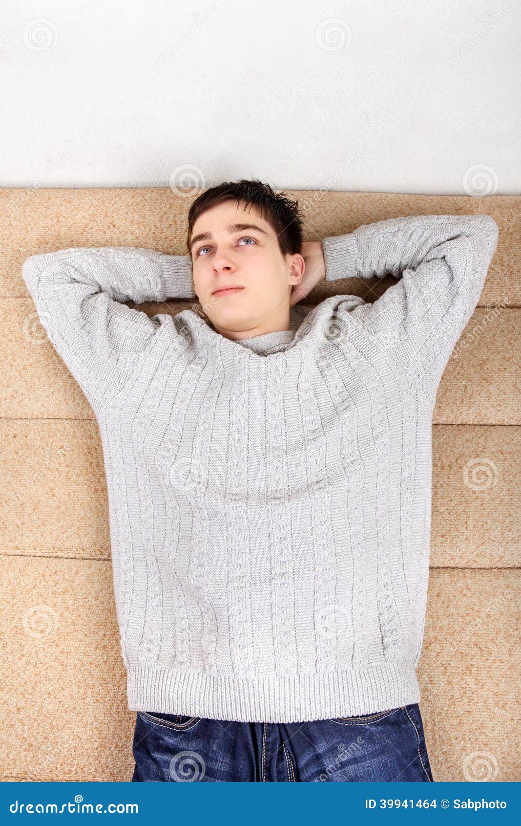 Teenager resting on Sofa stock photo. Image of comfortable - 39941464