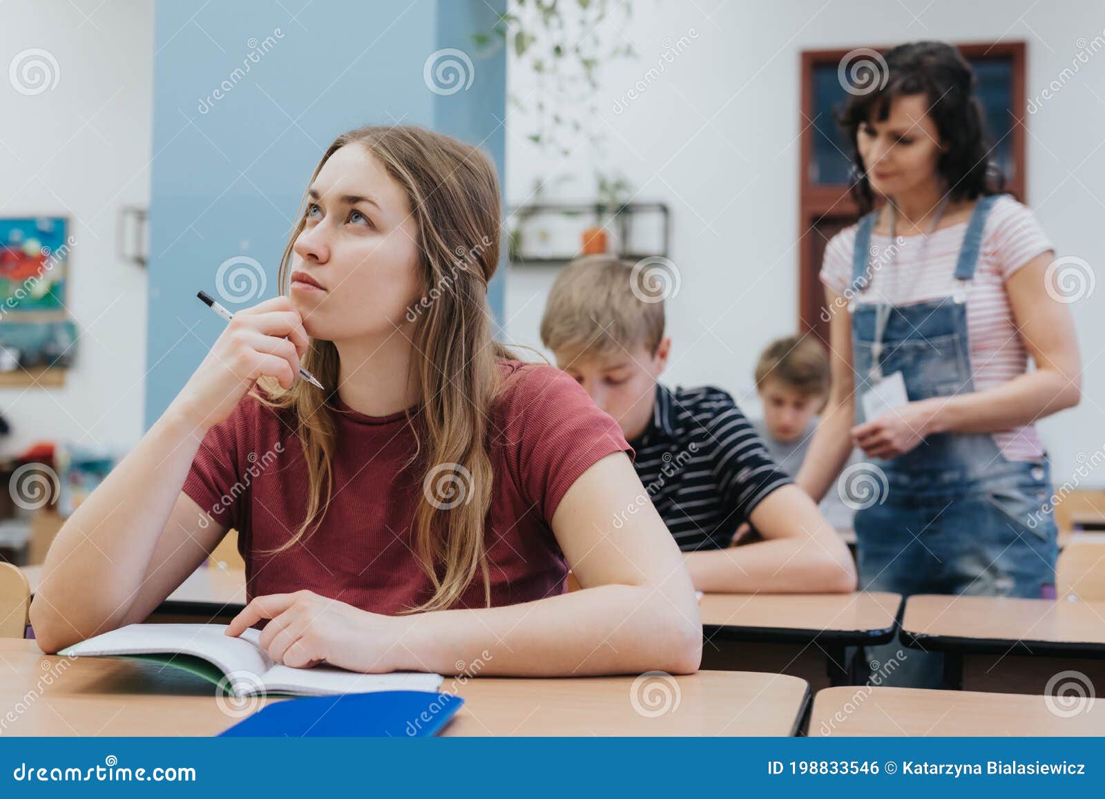 Teenager Sitting at the Table during Class Stock Photo - Image of ...