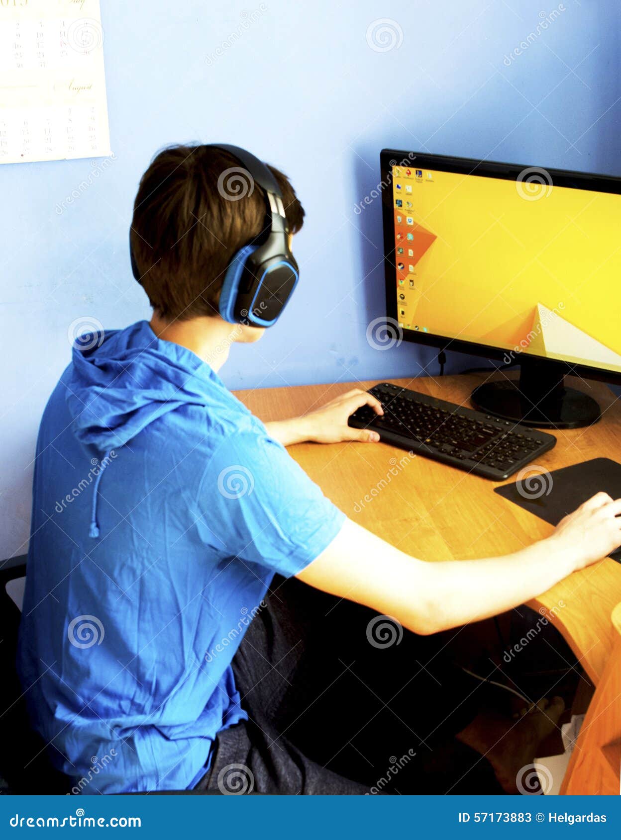 Teenager using computer editorial stock photo. Image of colour - 57173883