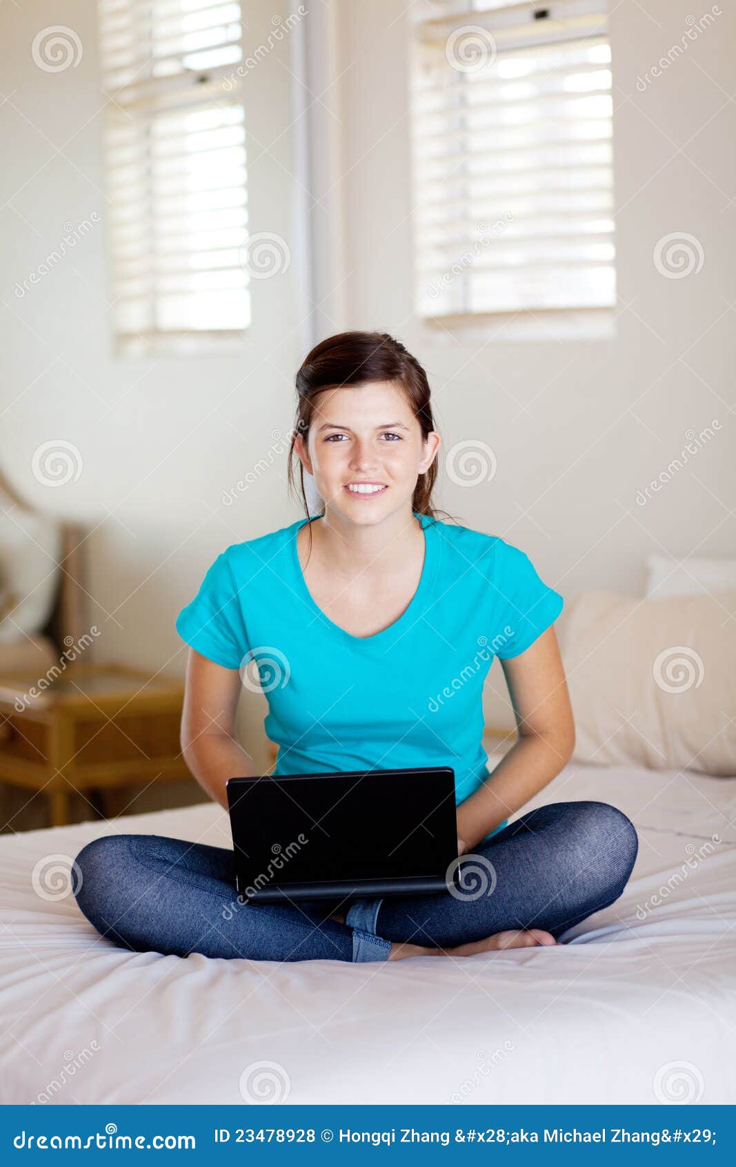 Teenager using laptop stock photo. Image of brunette - 23478928